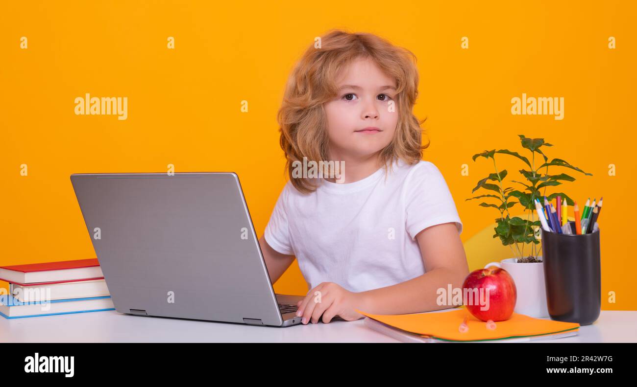 School child using laptop computer. School child student learning in ...