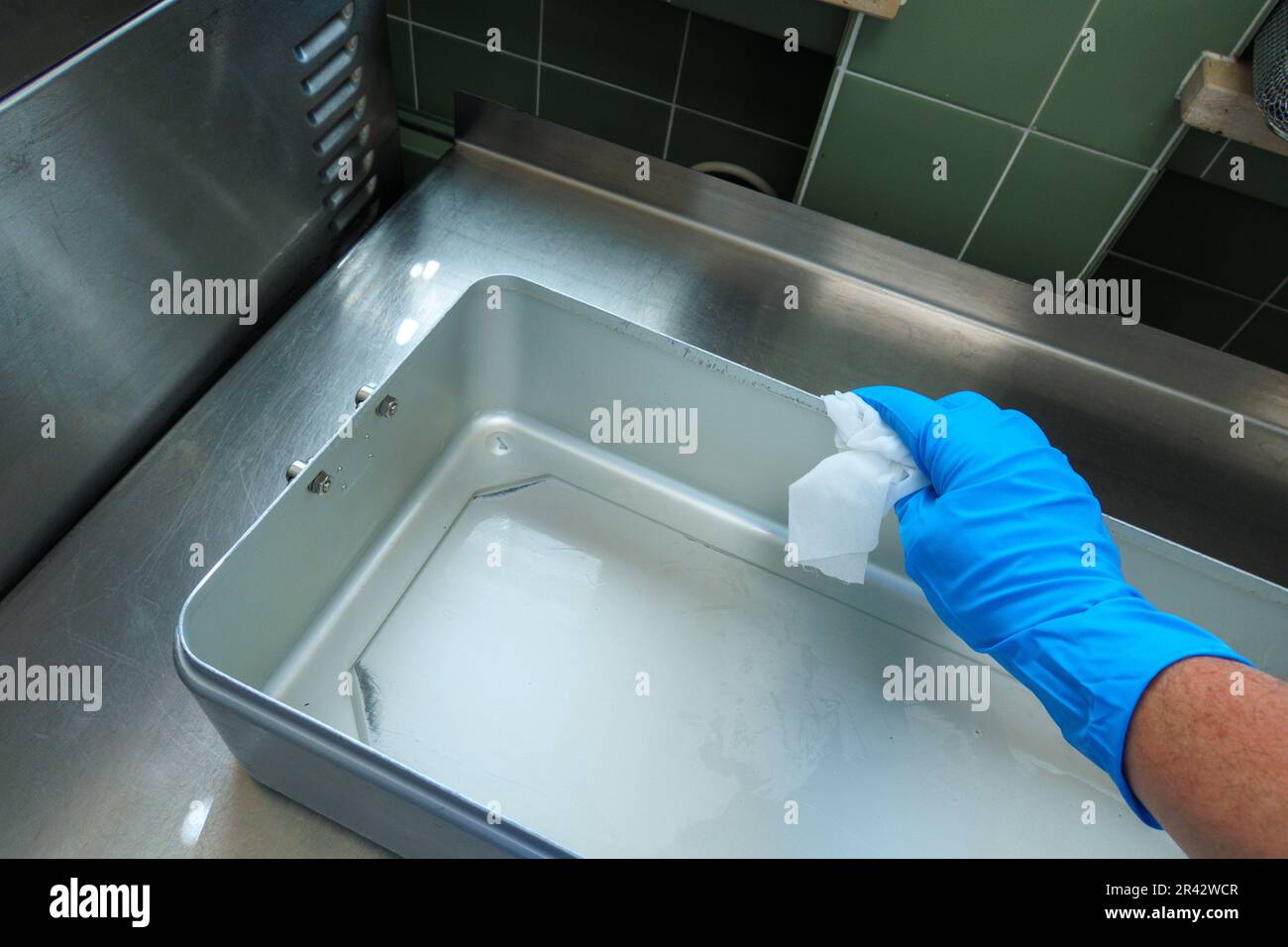 an instrument container is disinfected in a sterilization department ...