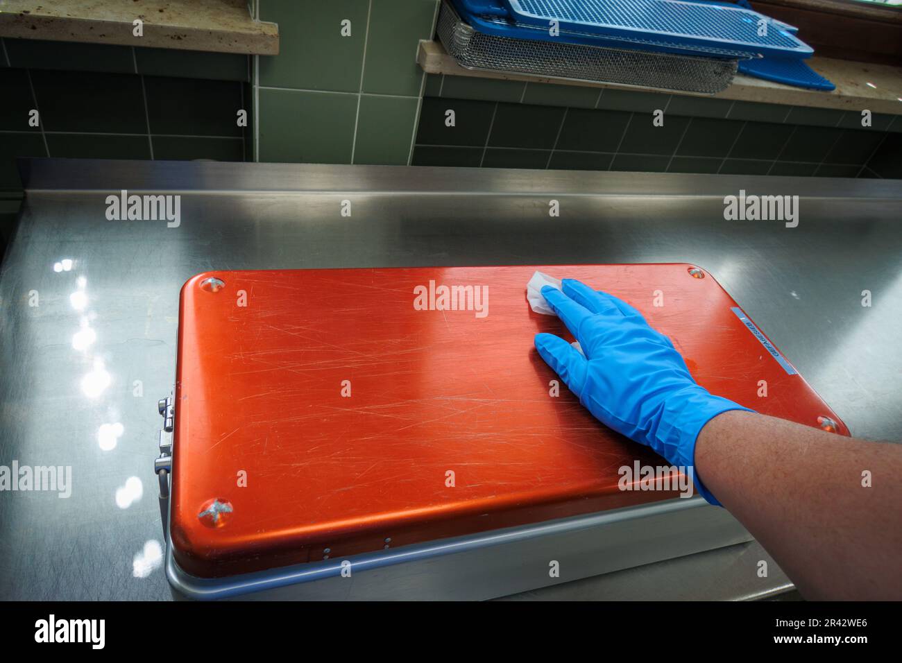 an instrument container is disinfected in a sterilization department ...