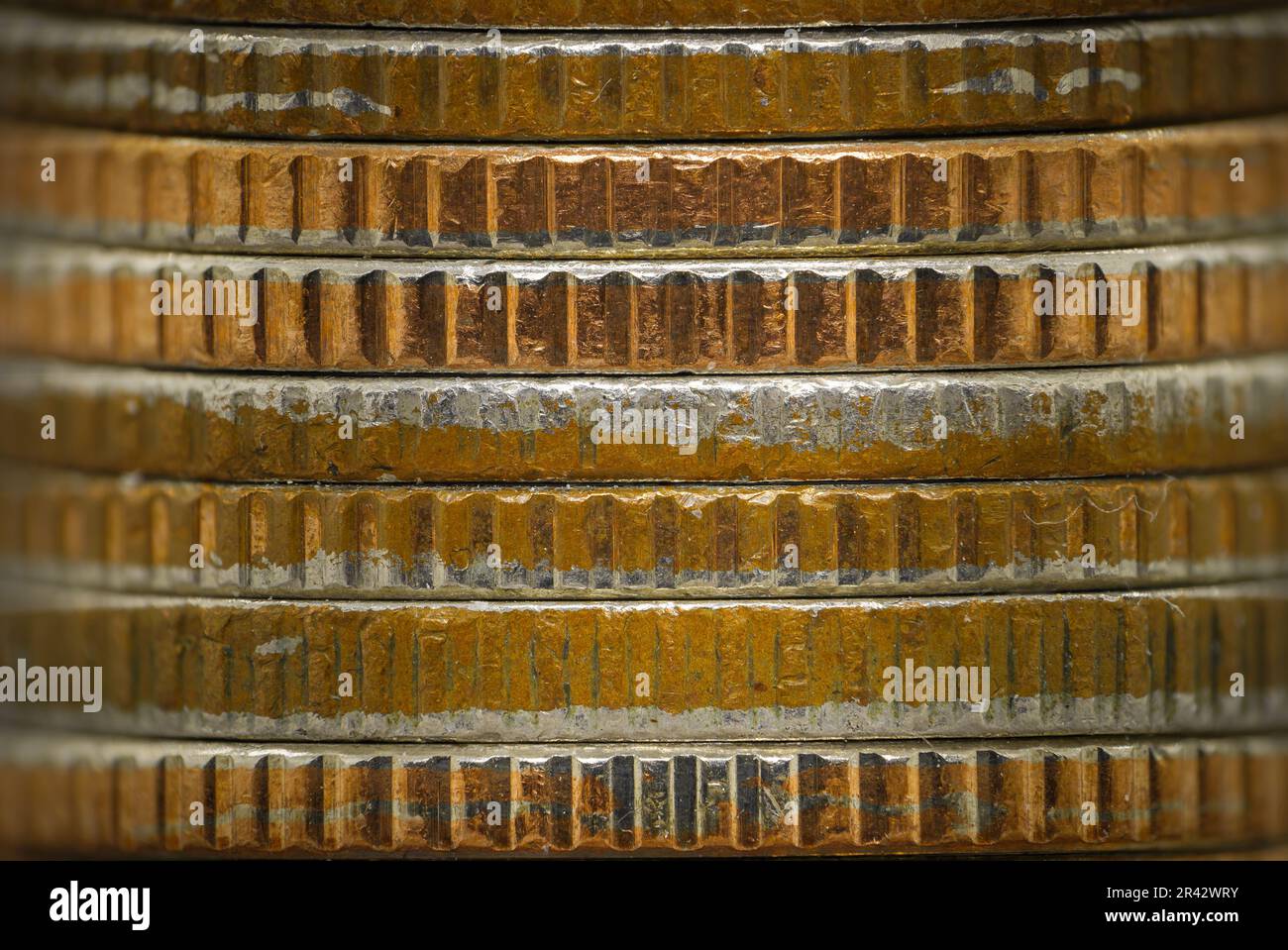 Pile of bronze coins, side view. Macro close up Stock Photo - Alamy