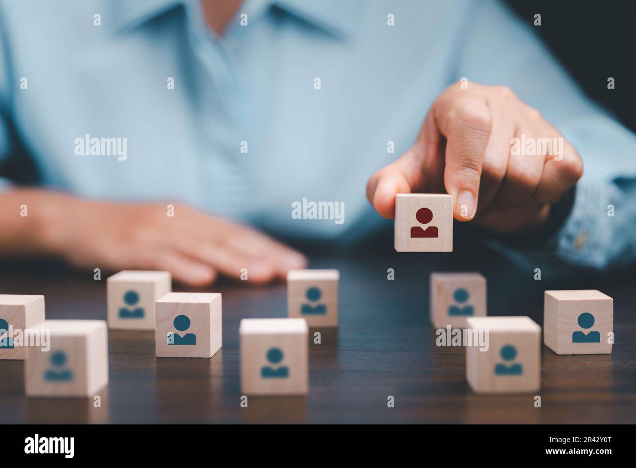 Manager chooses and hiring team for business success. HR manager hand ...