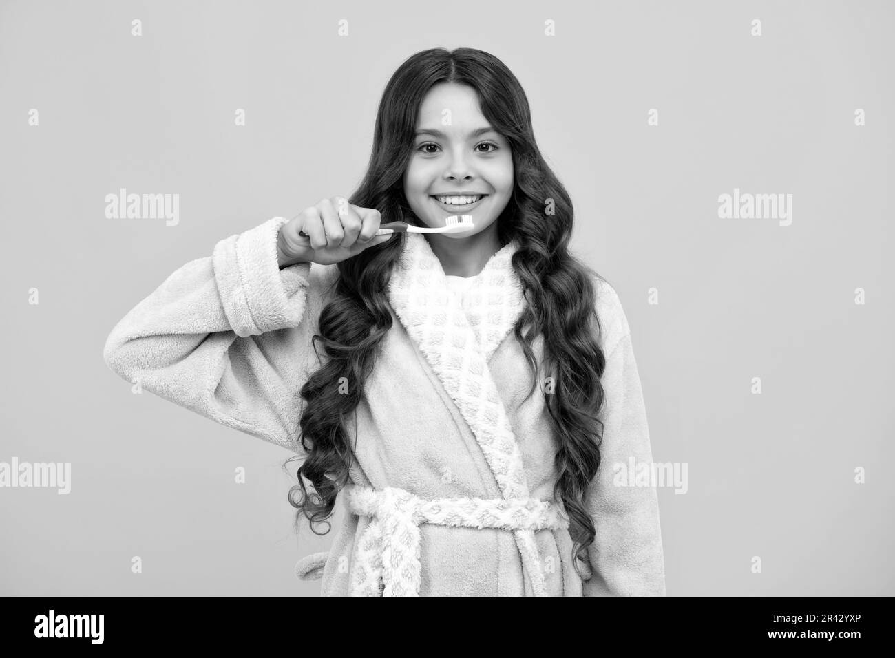 Morning brushing teeth. Teen girl hold toothbrush, childhood happiness ...