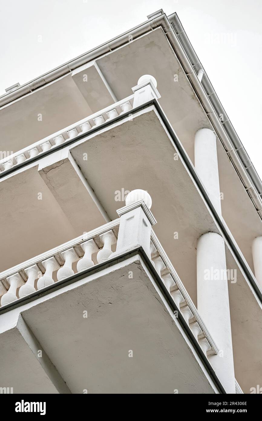 Vintage building with multi level balconies decorated with classic ...