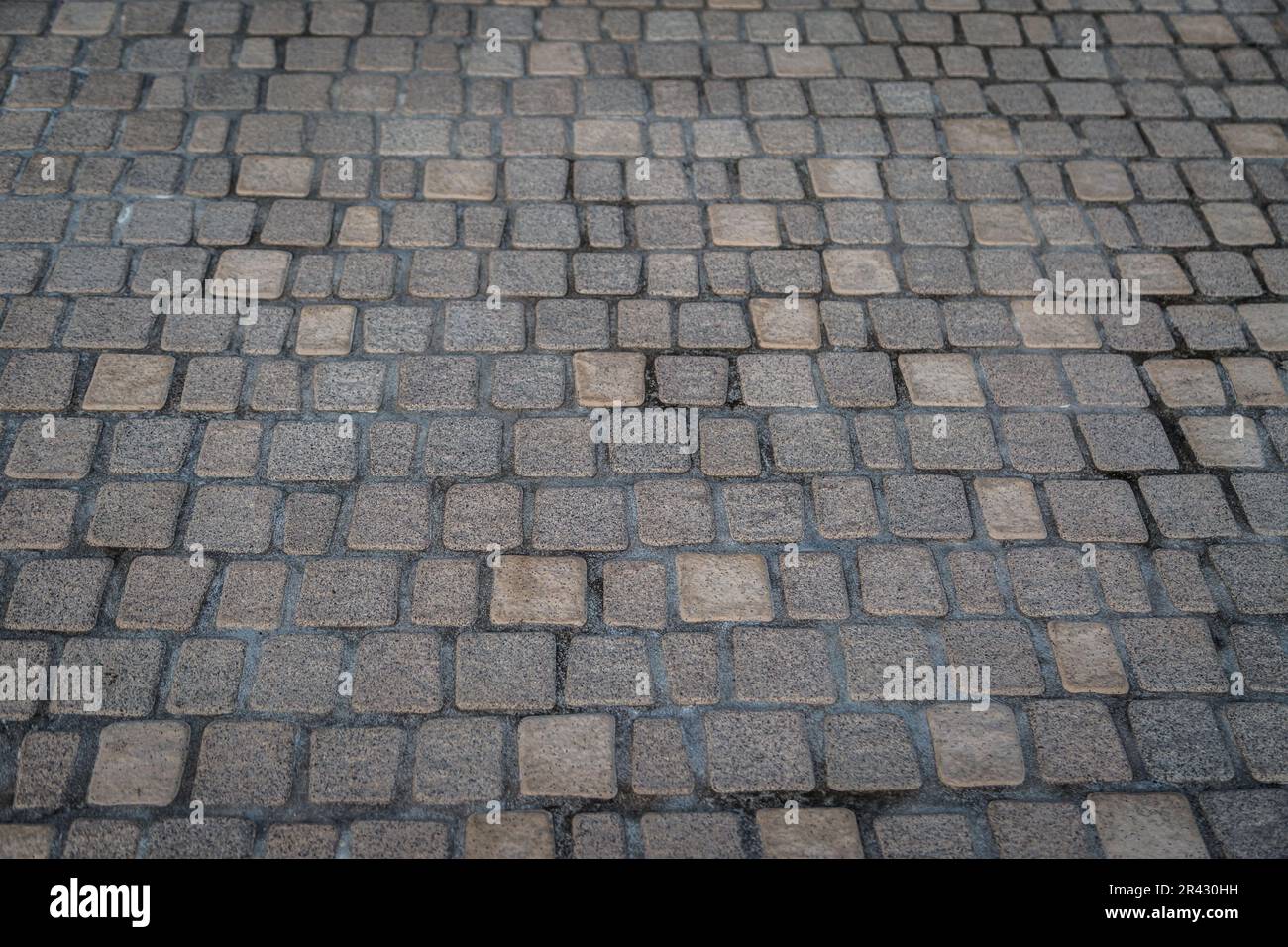 Cobblestone pavement texture background Stock Photo - Alamy