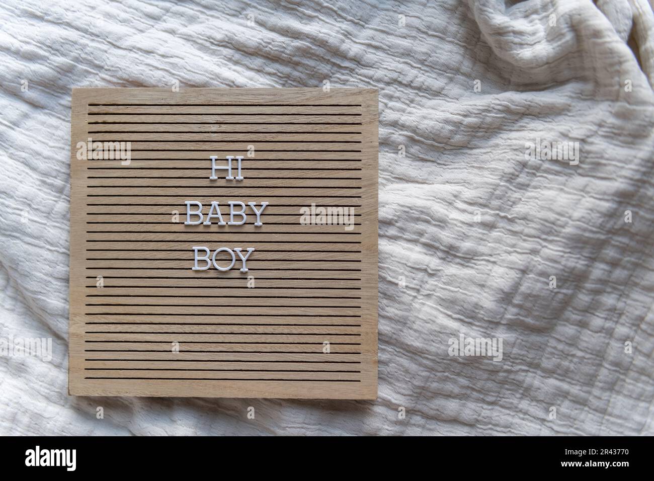 Hi baby boy wooden brown letter board with white letters Stock Photo ...