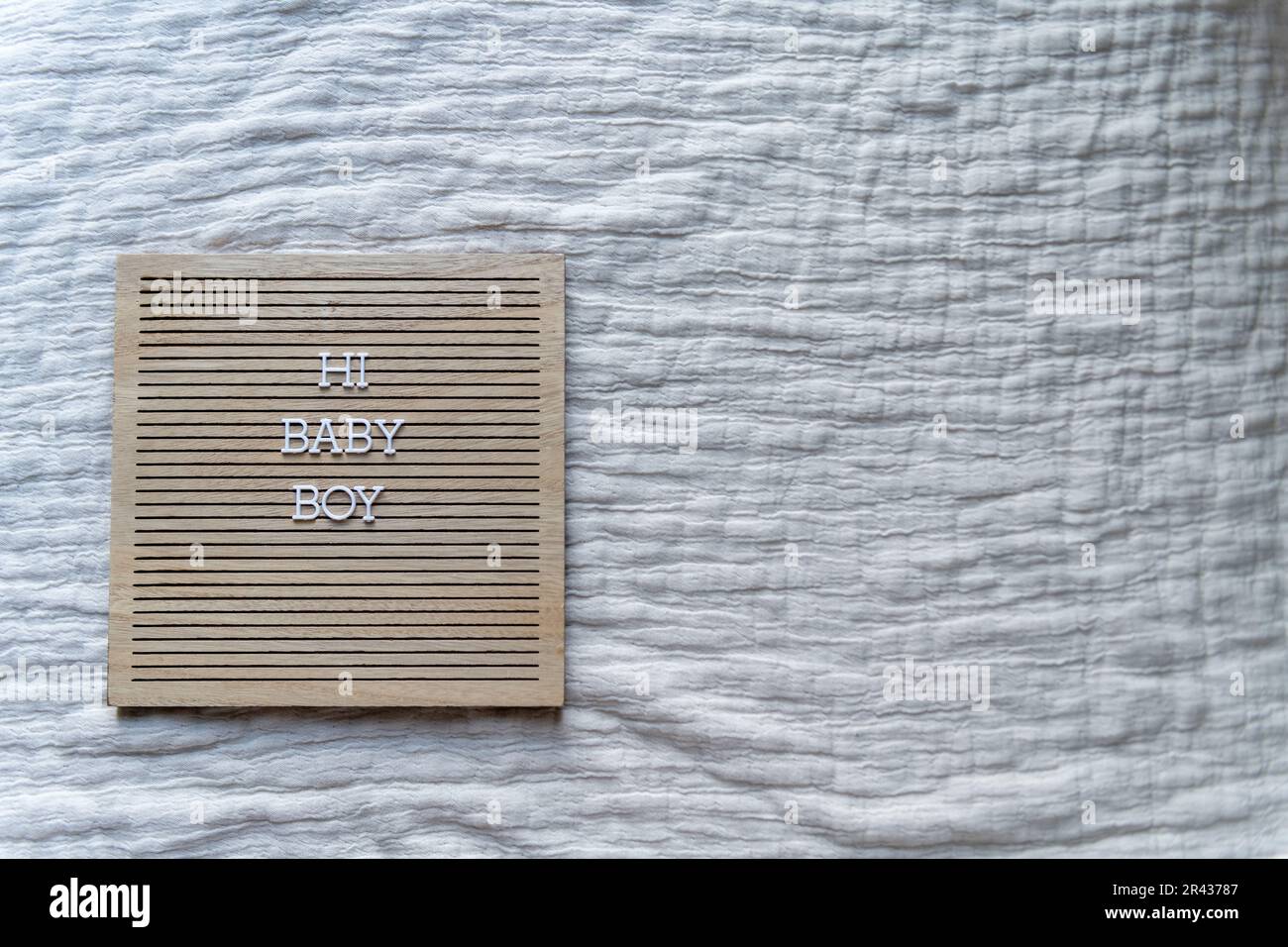 Hi baby boy wooden brown letter board with white letters Stock Photo ...