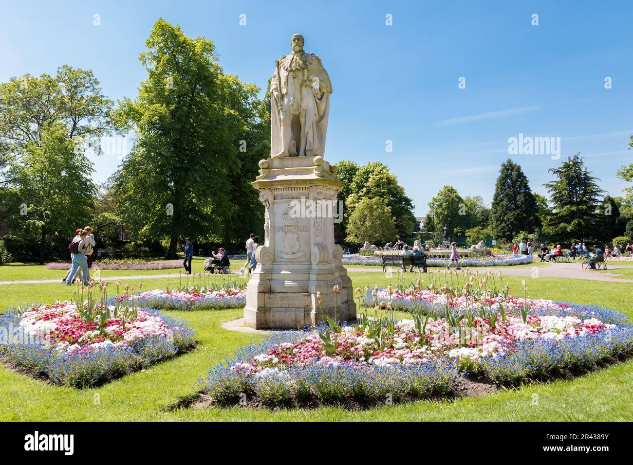 A Portland stone statue of King Edward VII standing proudly on a plinth ...