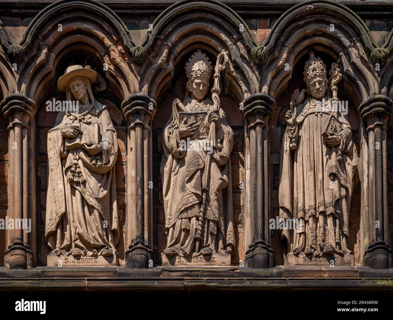 Stone carvings adorn the West front of Lichfield cathedral. The ...