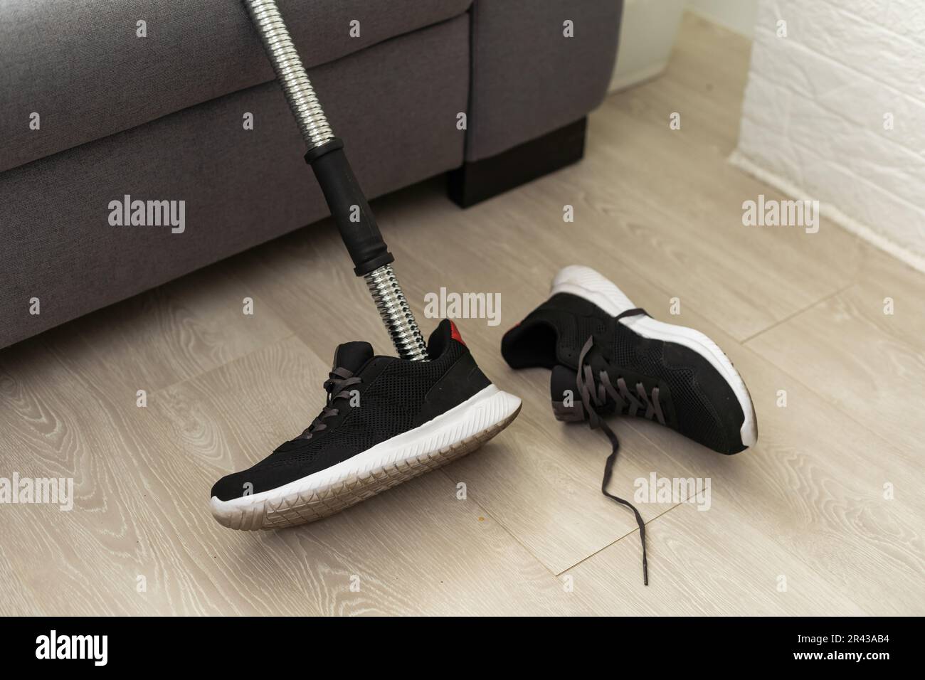 High angle background of disassembled prosthetic leg and foot on table ...