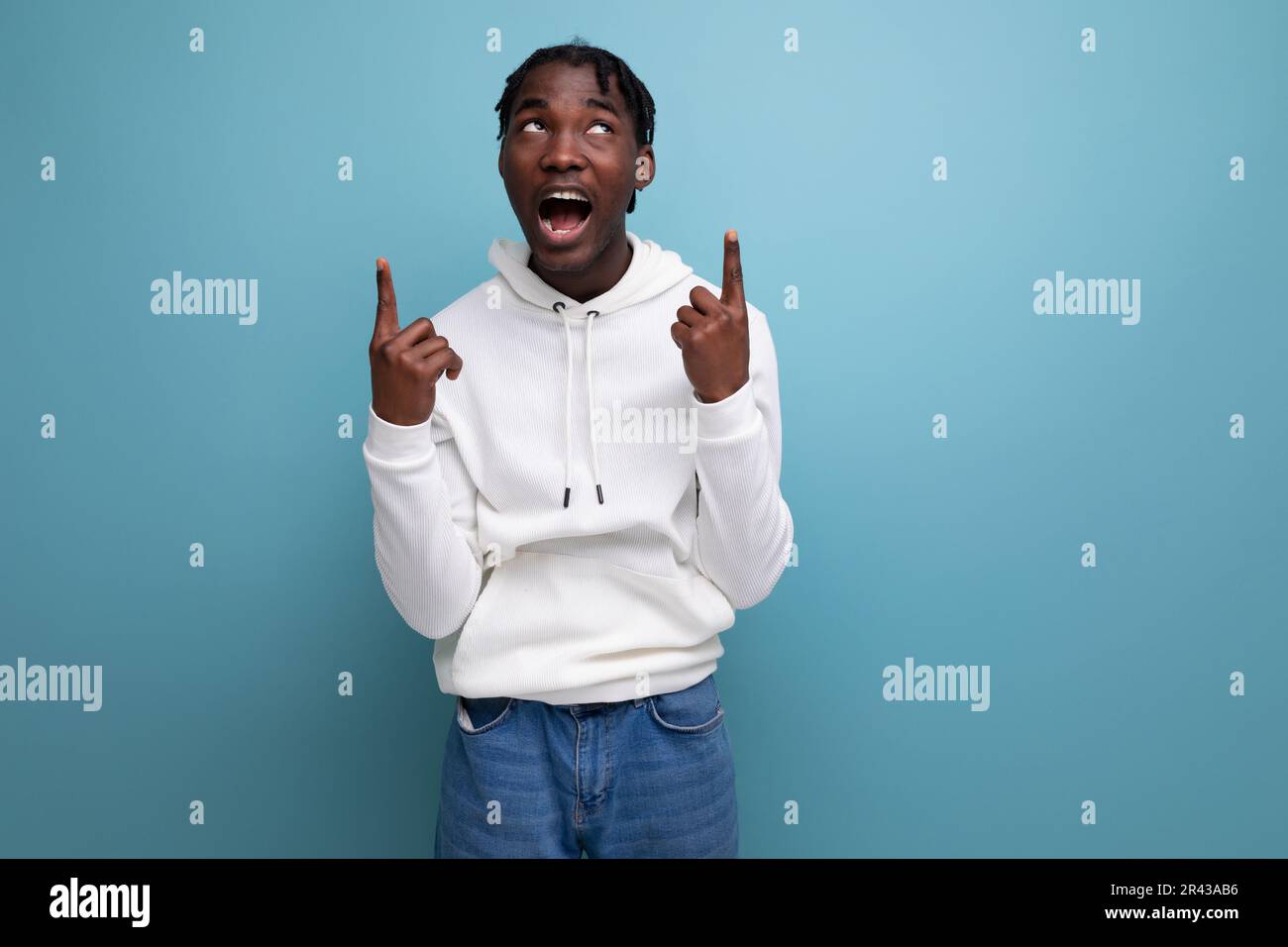 joyful winner black american young brunette man Stock Photo - Alamy