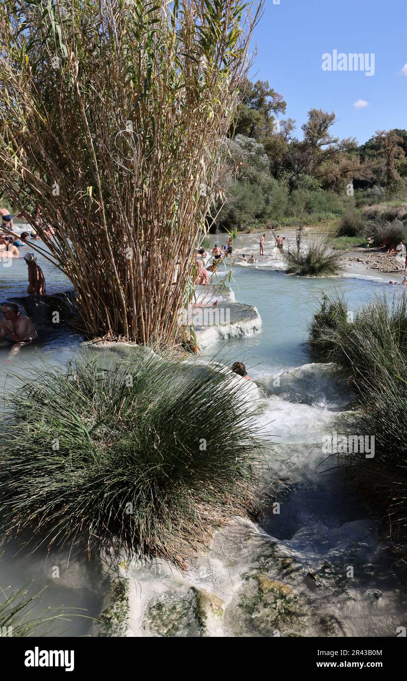 Saturnia, Italy - September 13, 2022: People are bathing in the hot ...