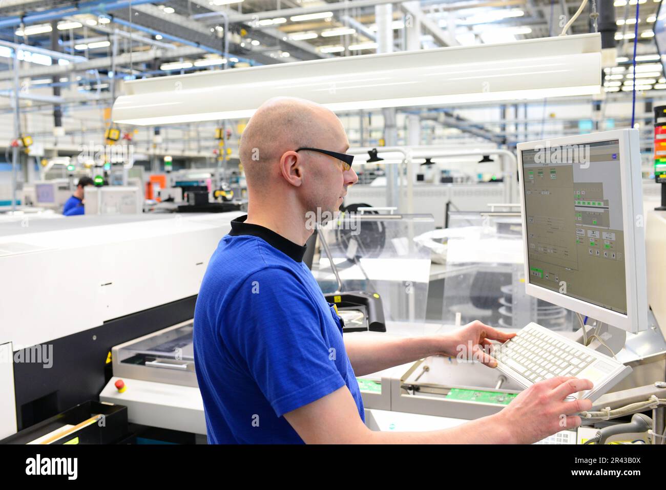 production and assembly of microelectronics in a hi-tech factory - man ...