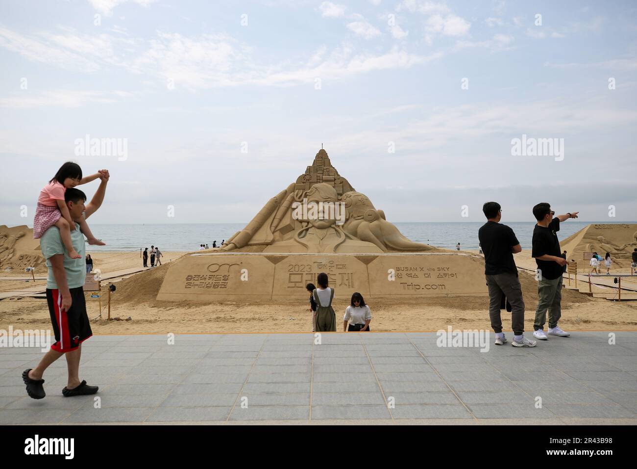 Busan, South Korea. 26th May, 2023. Tourists view a sand sculpture at Haeundae Beach in Busan ...