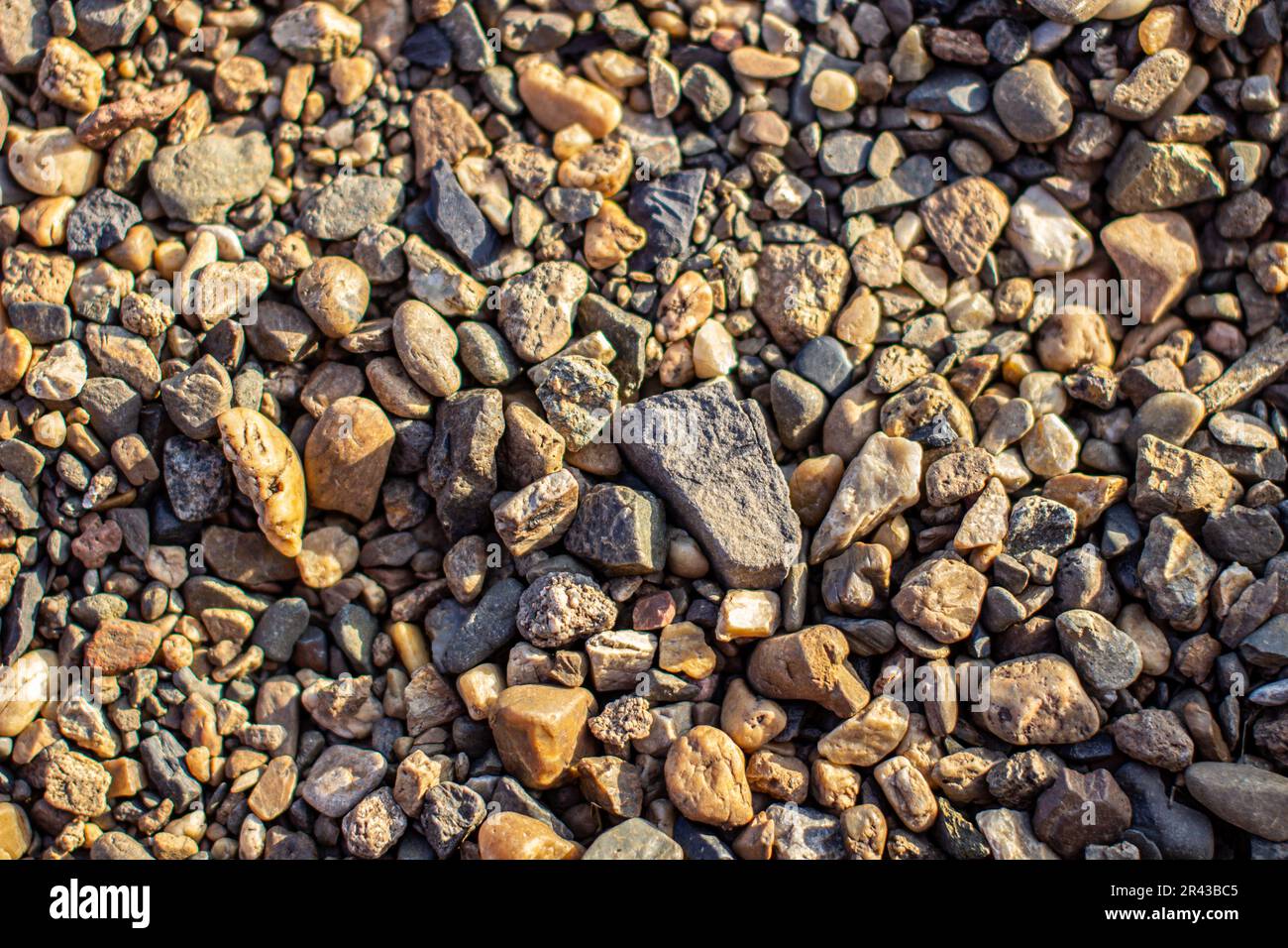 Crushed stone on the seashore. Selective focus on object. The stones ...