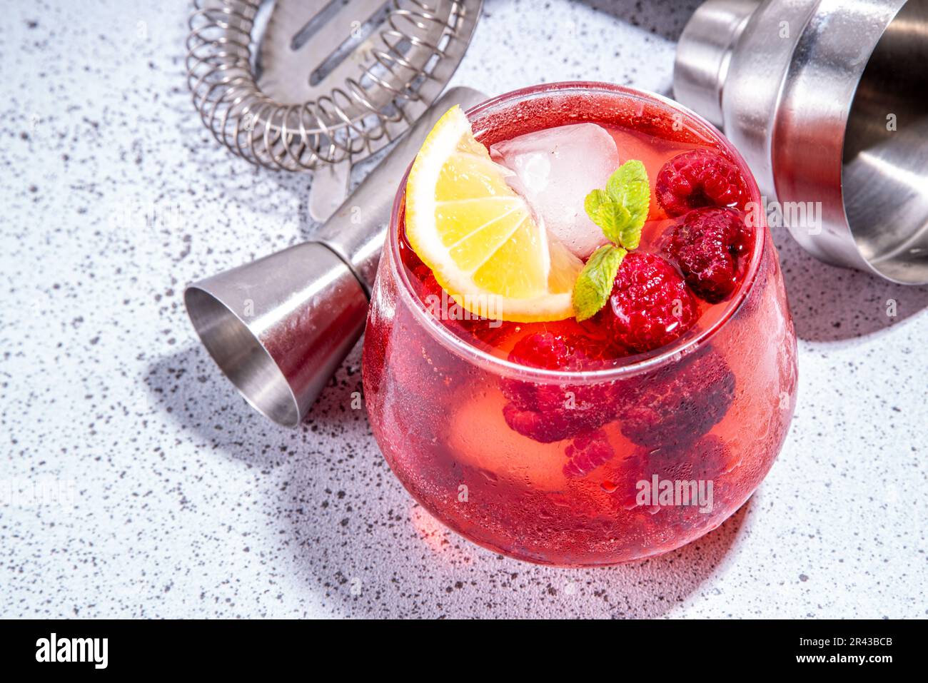 Refreshing summer infused fruit water. Iced lemonade with raspberry ...