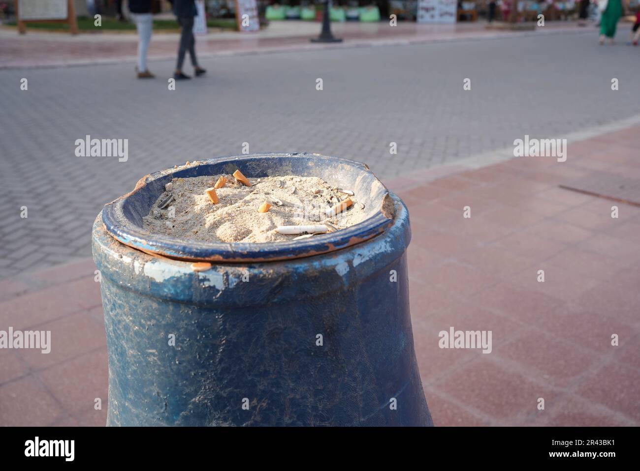 Cigarette butt disposal urn in the street Stock Photo - Alamy
