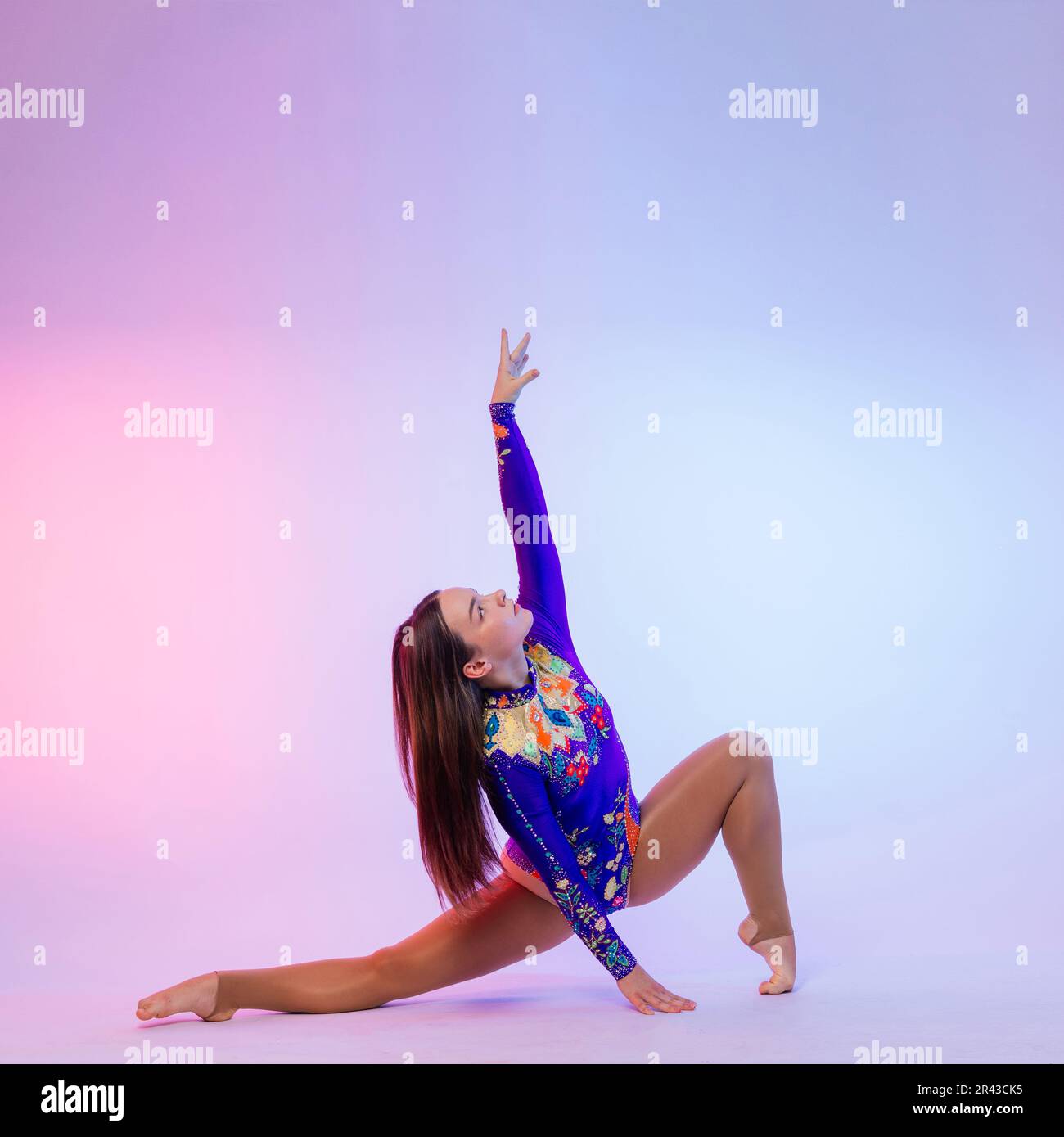 Beautiful cool young fit gymnast woman in sportswear dress working out ...