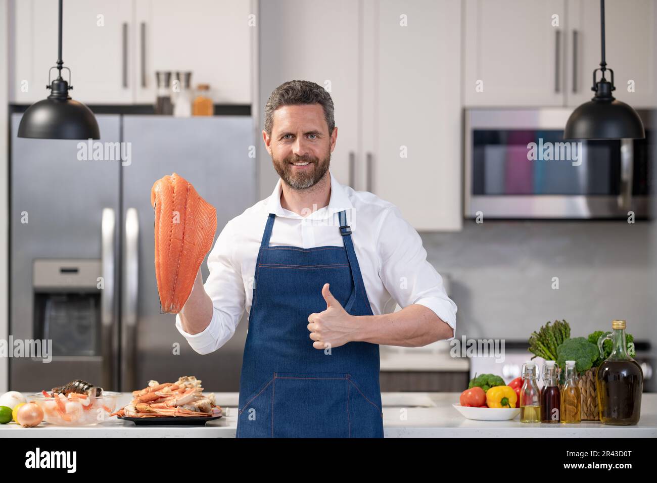 chef man cooking fish, thumb up. chef man cooking fish salmon. chef man ...