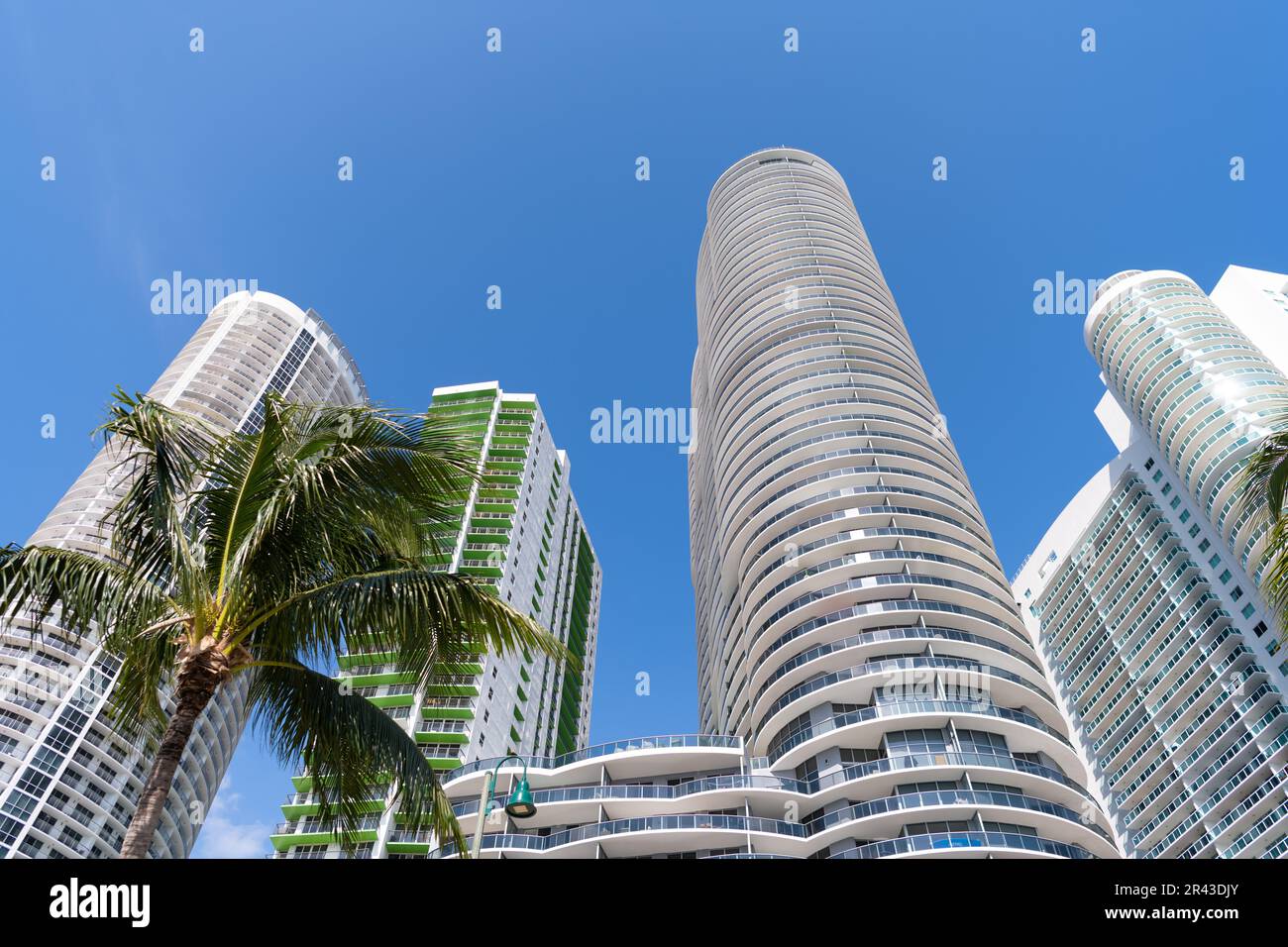 perspective photo of high skyscraper architecture on blue sky ...