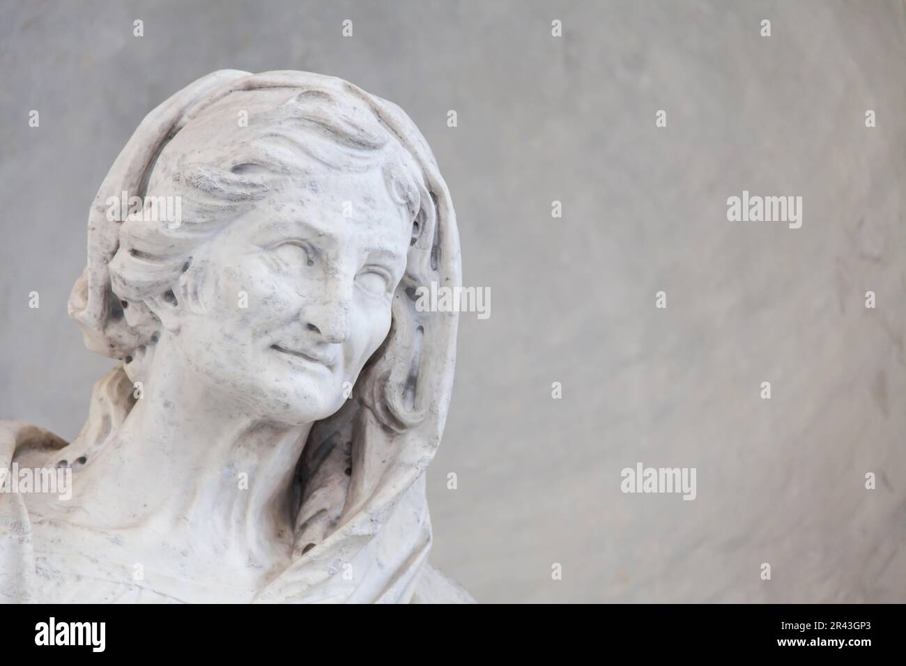 Ancient statue of an aged woman in an Italian church close to Torino ...