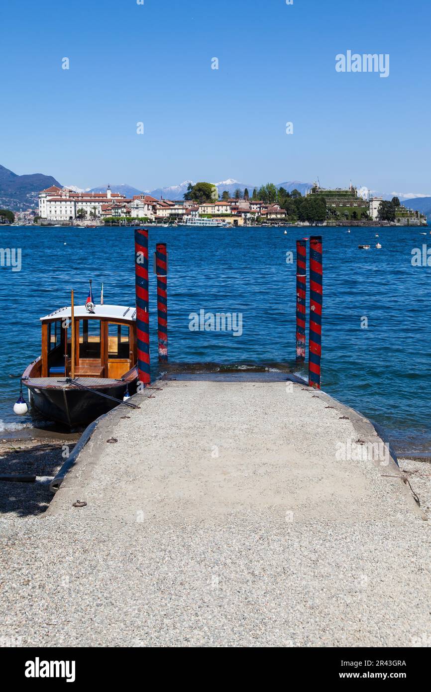 Small boat in front of Isola Bella, the most beautiful of the three ...