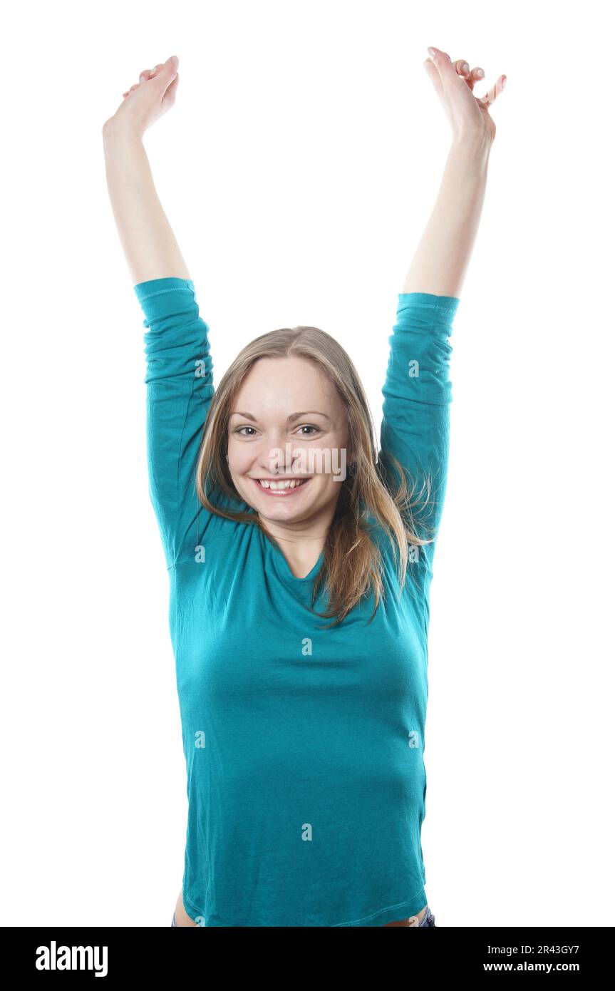 Pretty young blonde woman cheering with arms upraised Stock Photo - Alamy