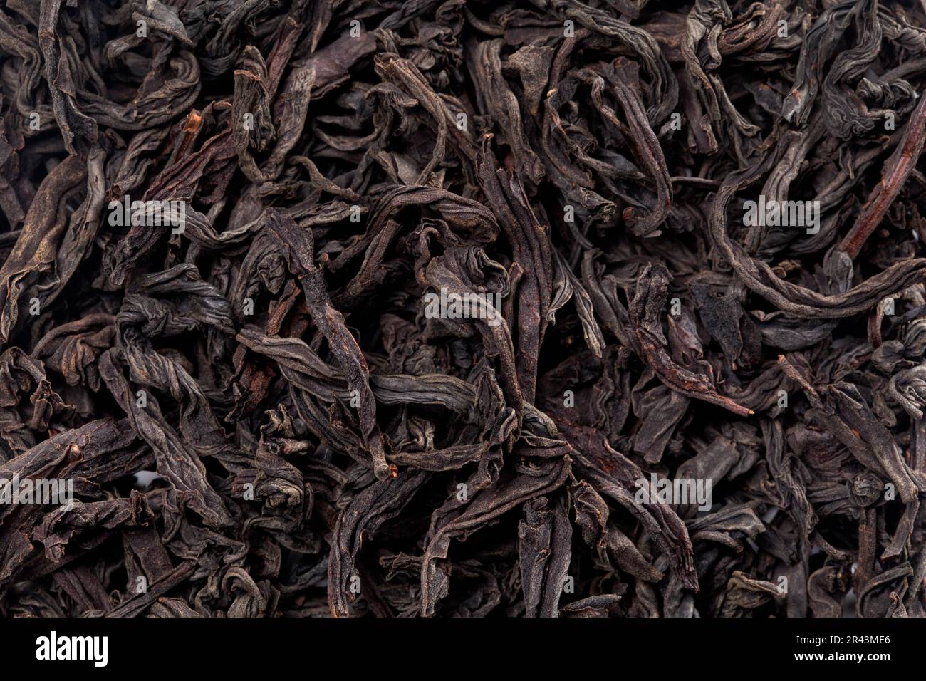 Black tea background Stock Photo - Alamy