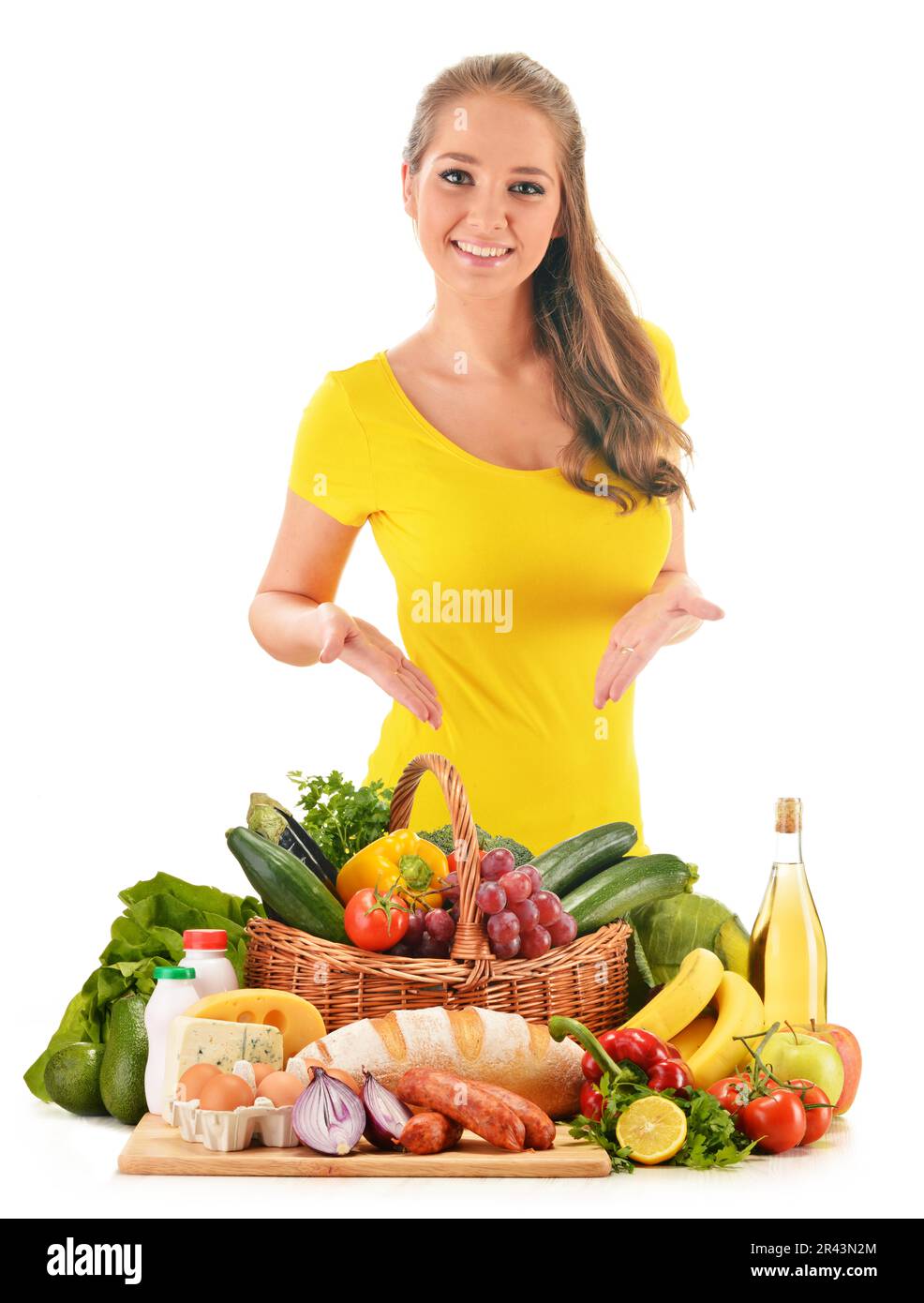 Assorted grocery products including vegetables fruits wine bread dairy ...