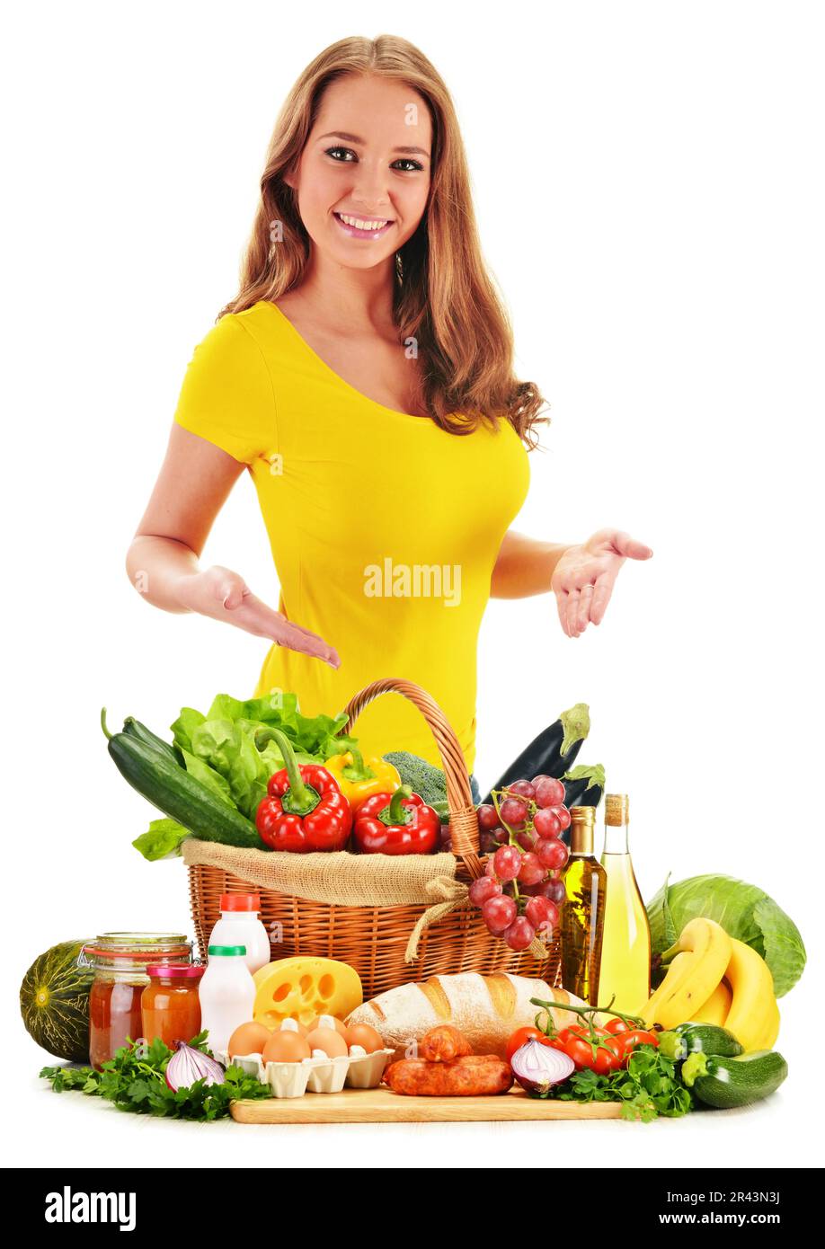 Assorted grocery products including vegetables fruits wine bread dairy ...