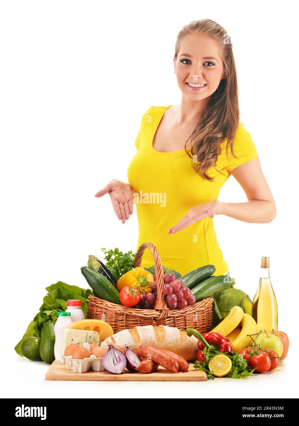 Assorted grocery products including vegetables fruits wine bread dairy ...