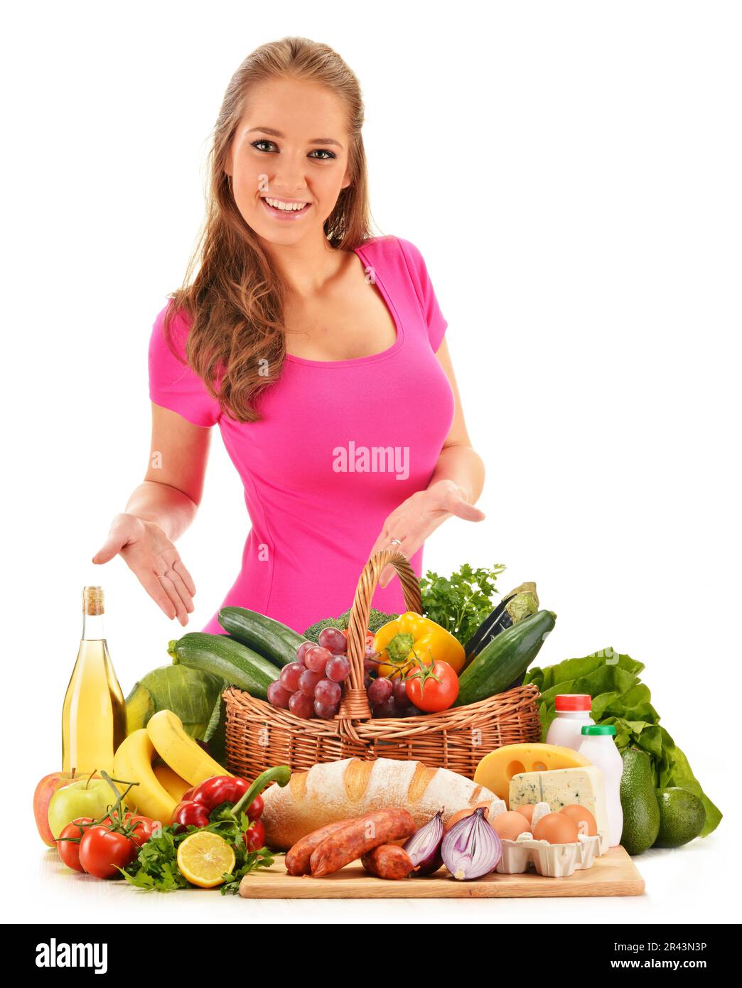 Assorted grocery products including vegetables fruits wine bread dairy ...