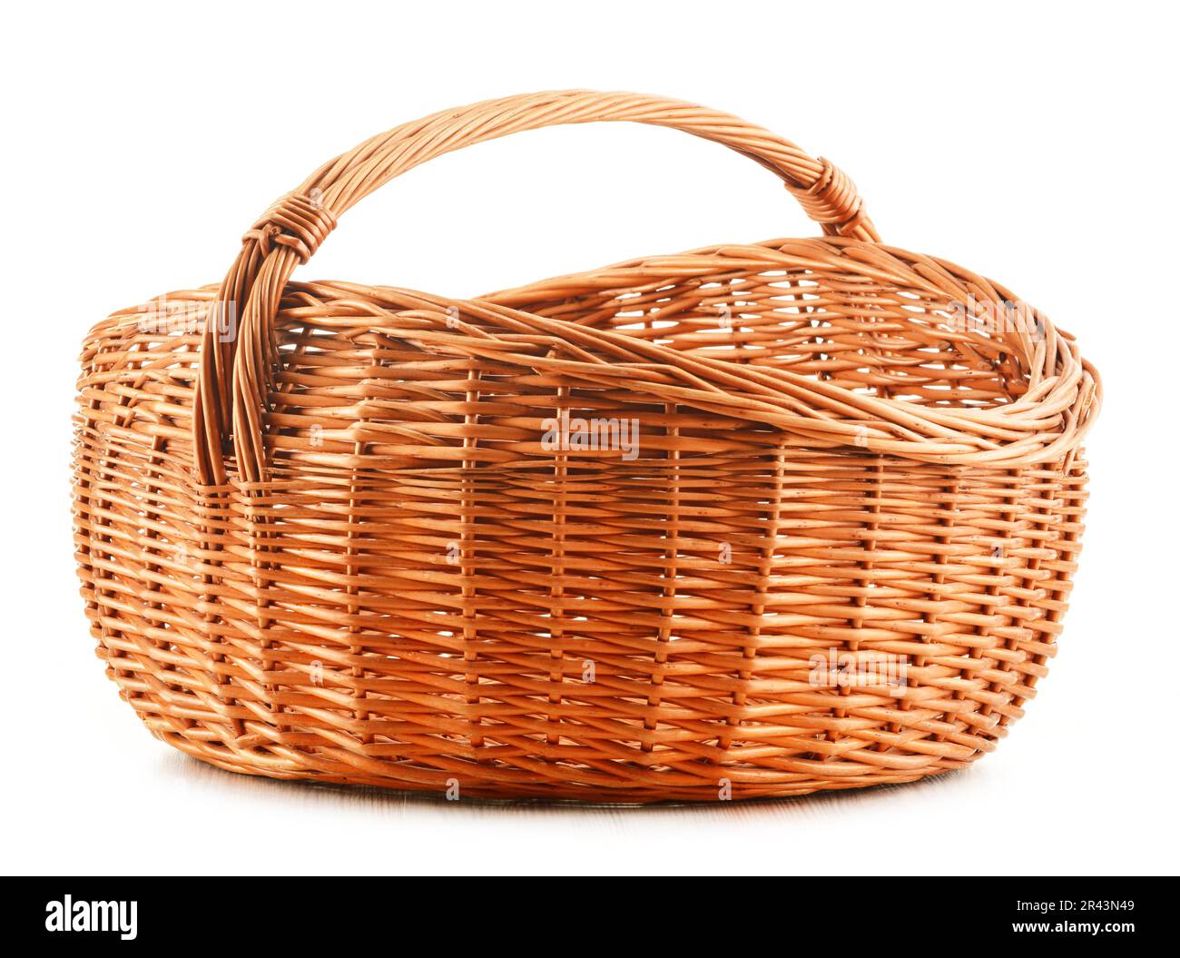 Empty wicker kitchen bowl isolated on white background Stock Photo - Alamy
