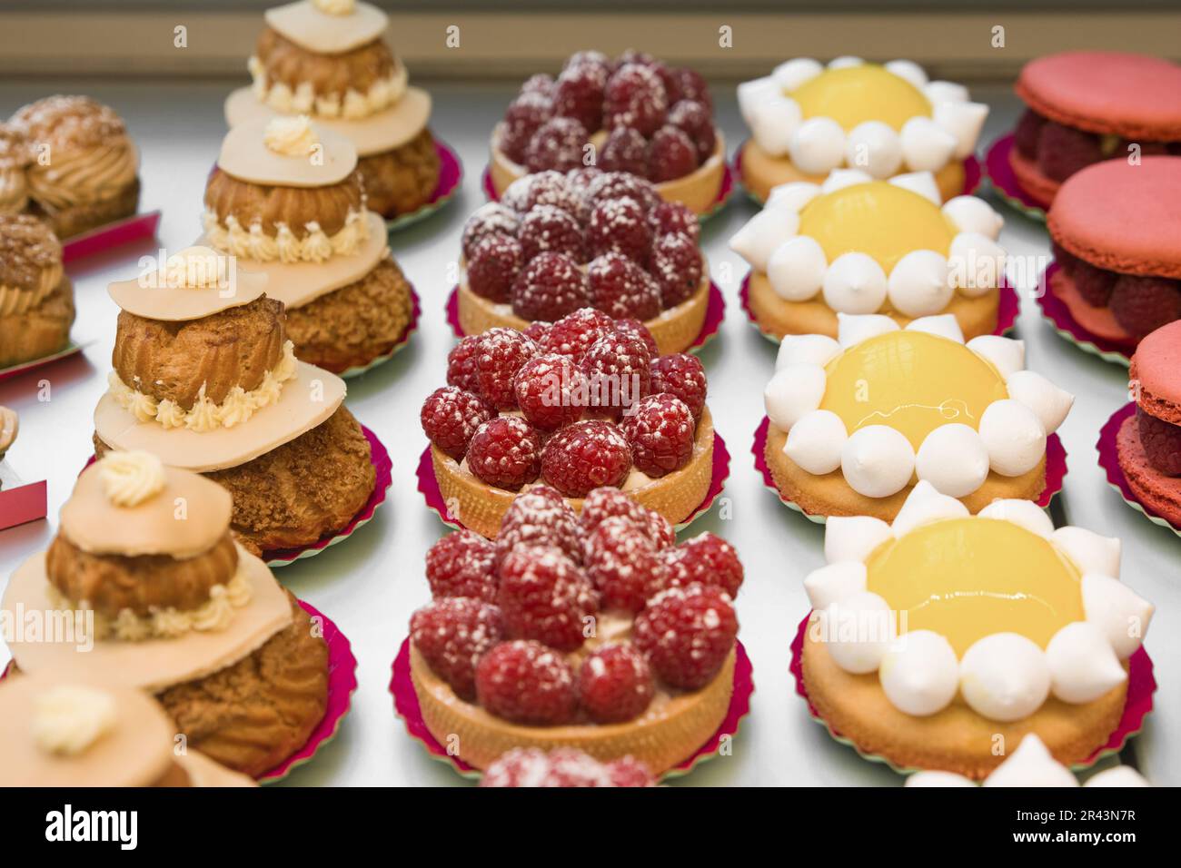Raspberry tartlets lemons the french macaroons Paris Brest Stock Photo ...
