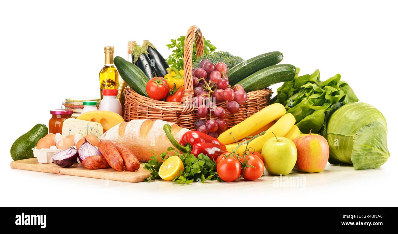 Assorted grocery products including vegetables fruits wine bread dairy ...