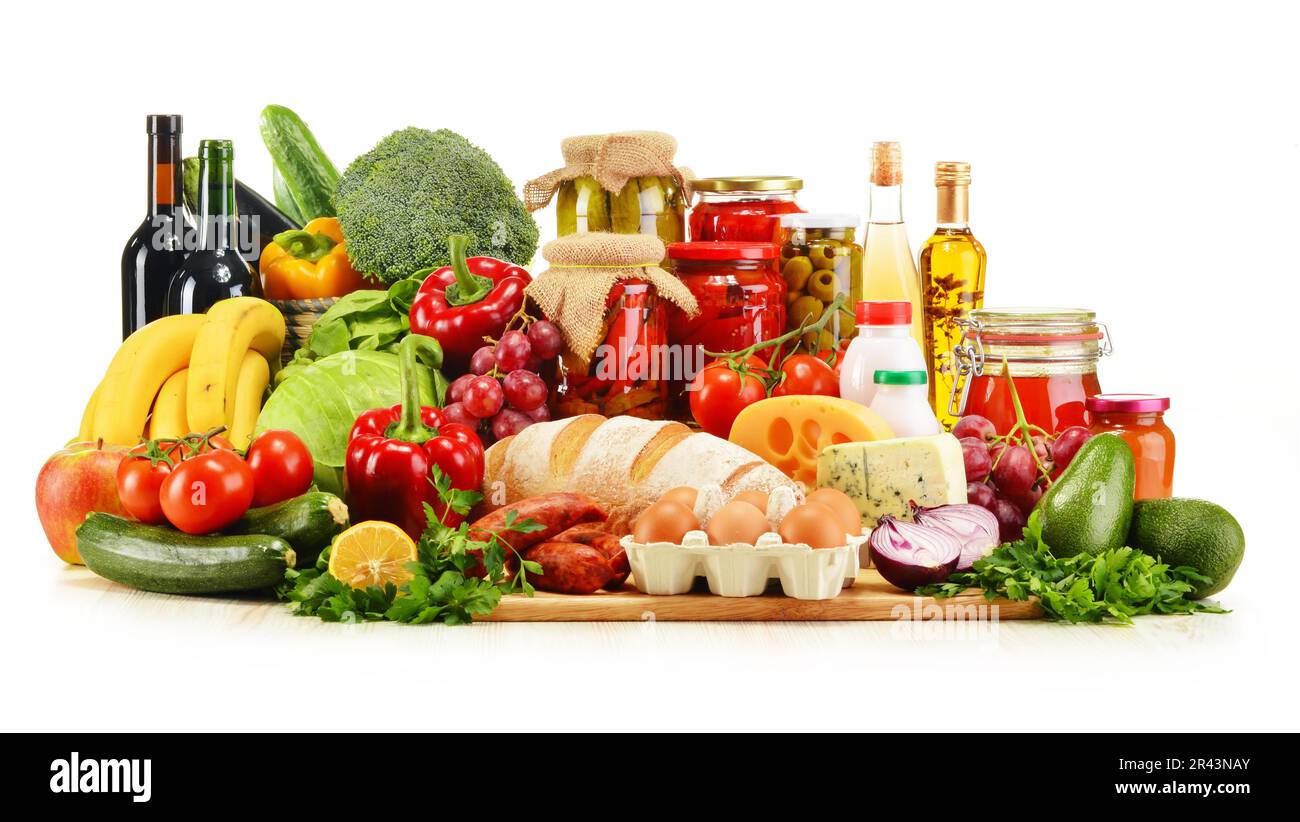 Assorted grocery products including vegetables fruits wine bread dairy ...