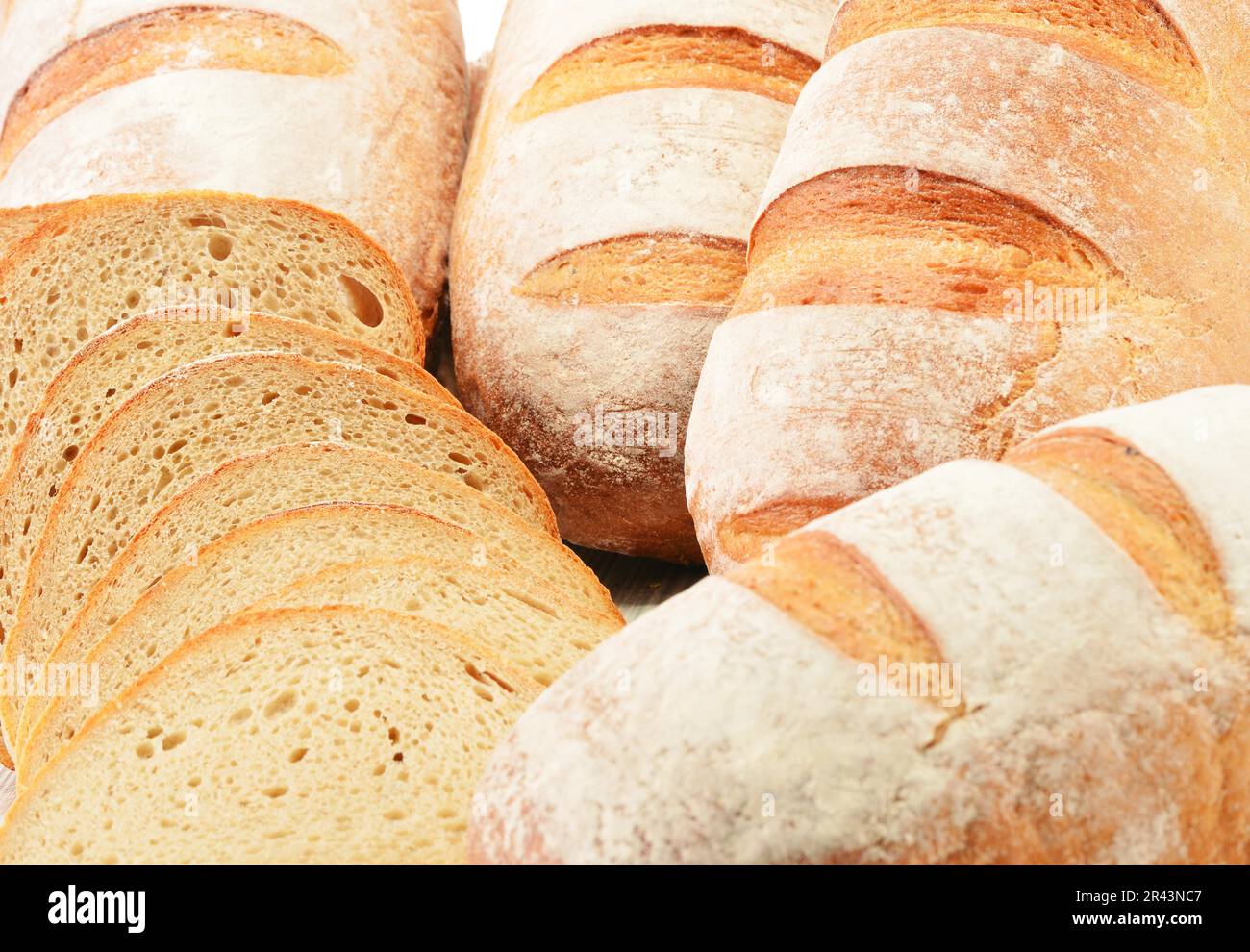 Composition with loafs of bread isolated on white background Stock ...