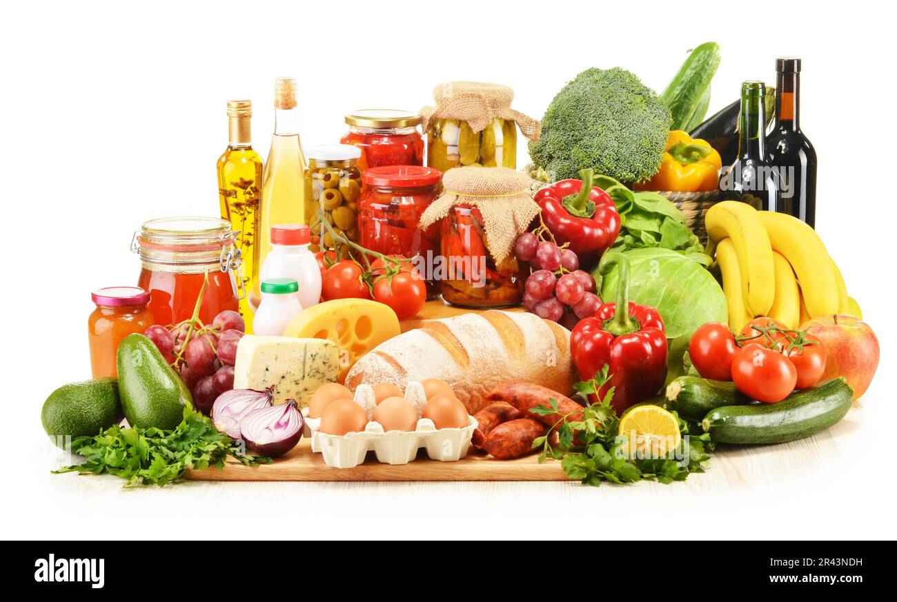 Assorted grocery products including vegetables fruits wine bread dairy ...