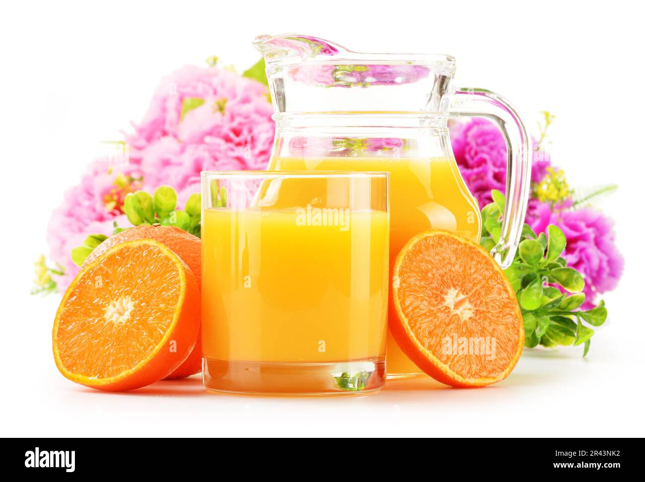 Composition with glass and jug of orange juice Stock Photo - Alamy
