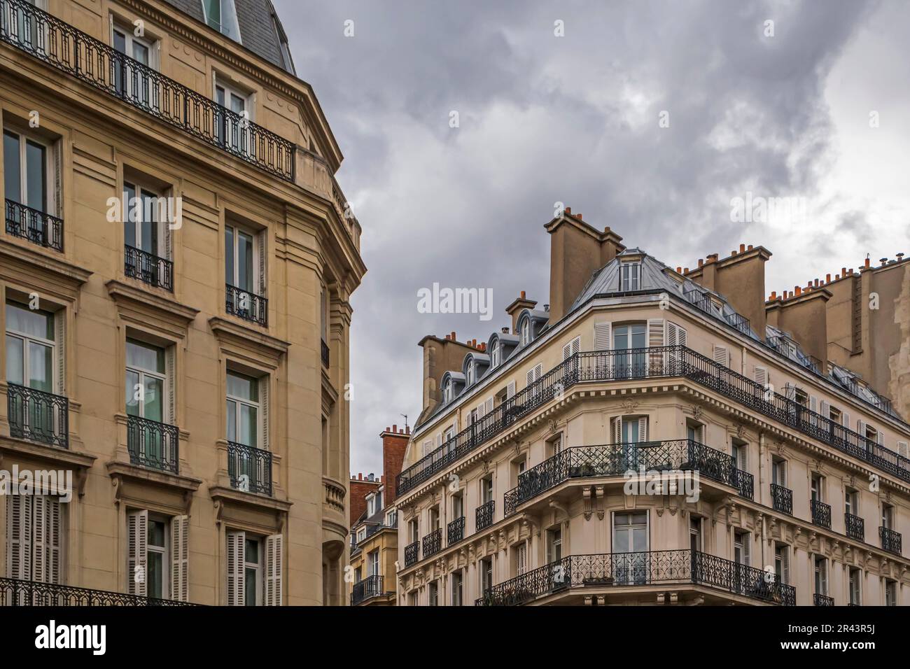 sight of old historical buildings in Paris against rain clouds Stock ...