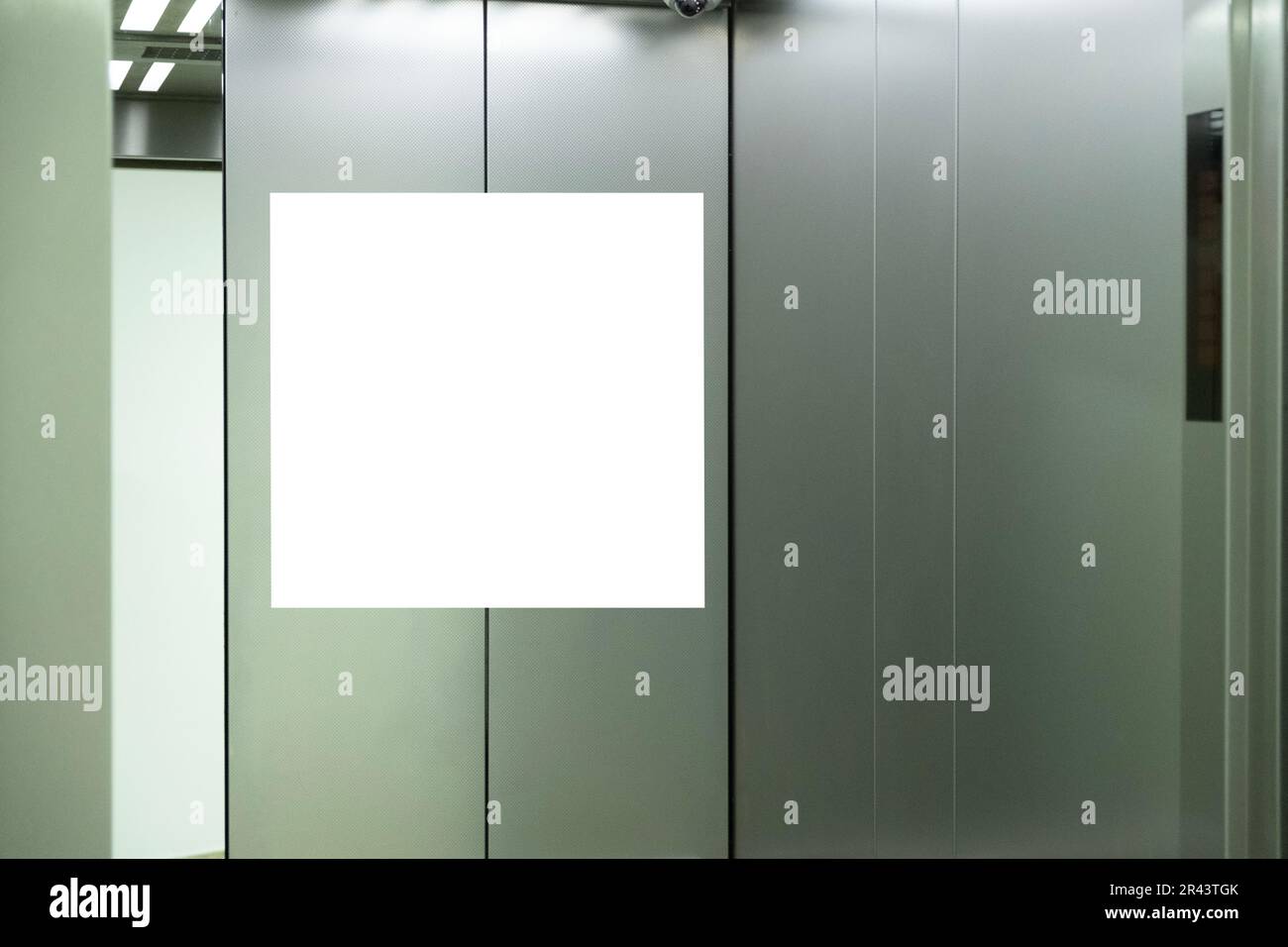 Mock up. Vertical poster media template frame hanging on the wall ...