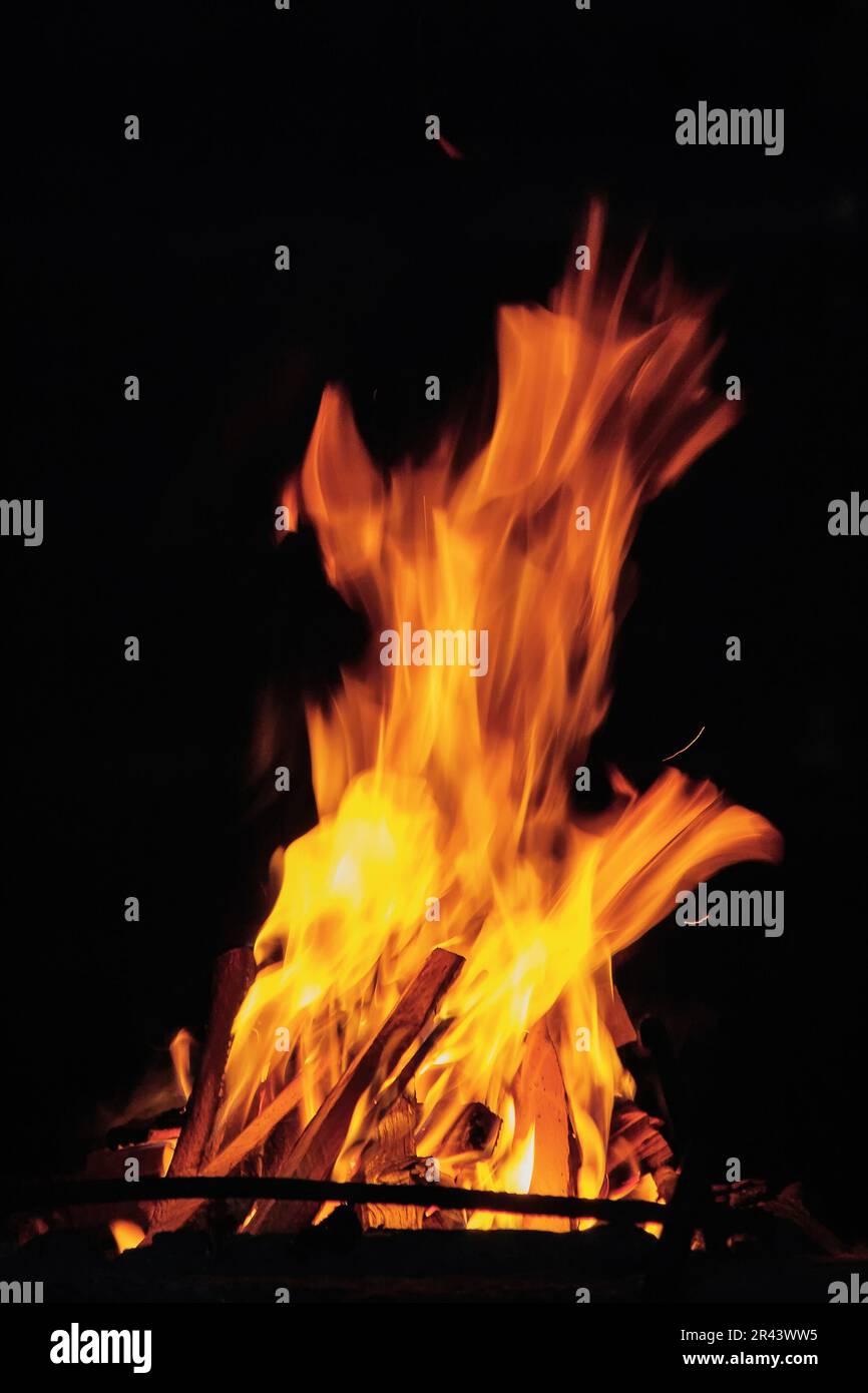 glowing orange flames of fire. symbol of heat and energy Stock Photo ...