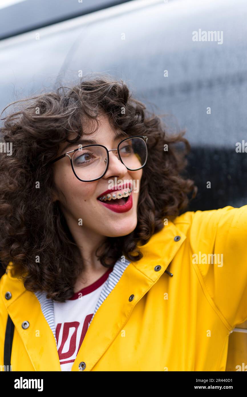 Woman curly hair in glasses hi-res stock photography and images - Alamy