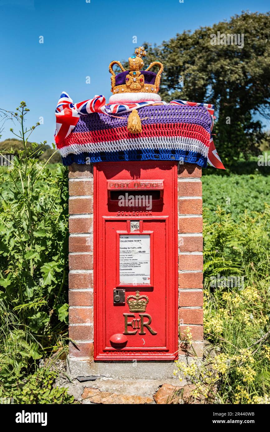 Decorated postbox on the island of jersey featuring a home made crown ...