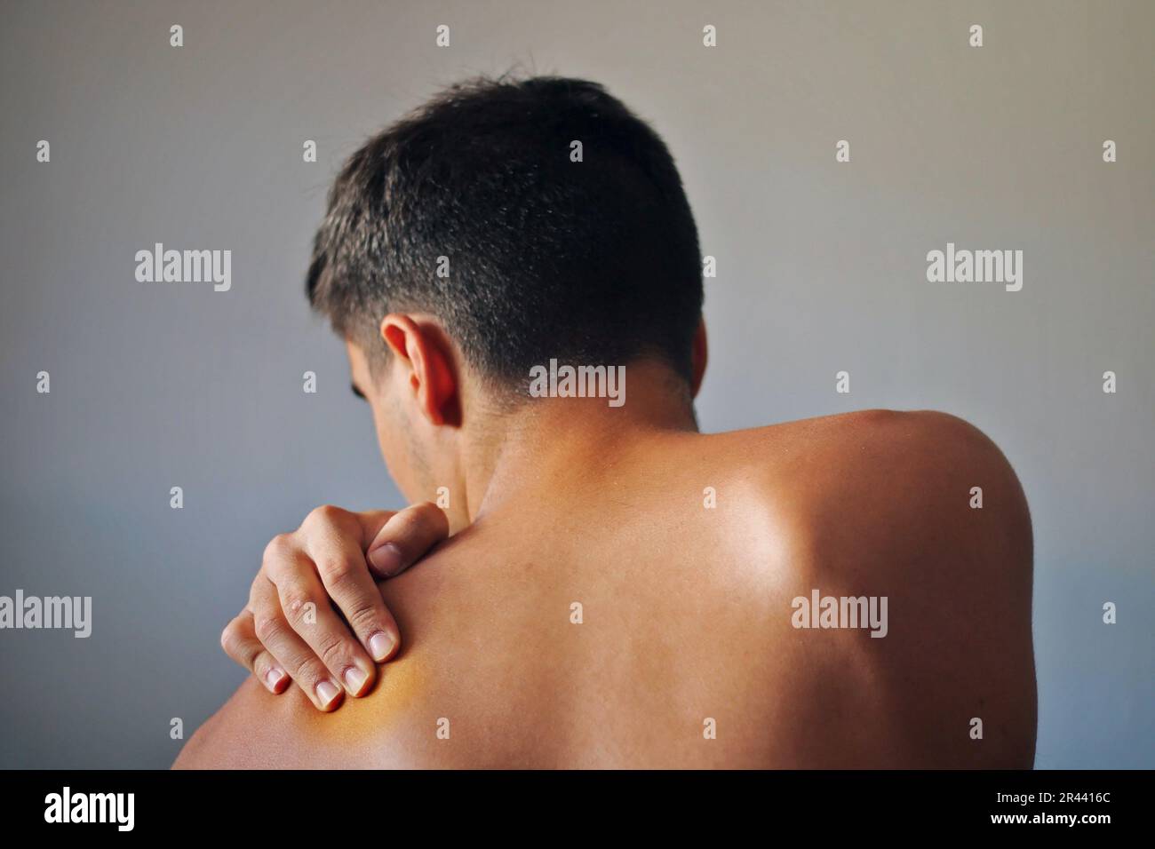 Man with pain in his back Stock Photo - Alamy