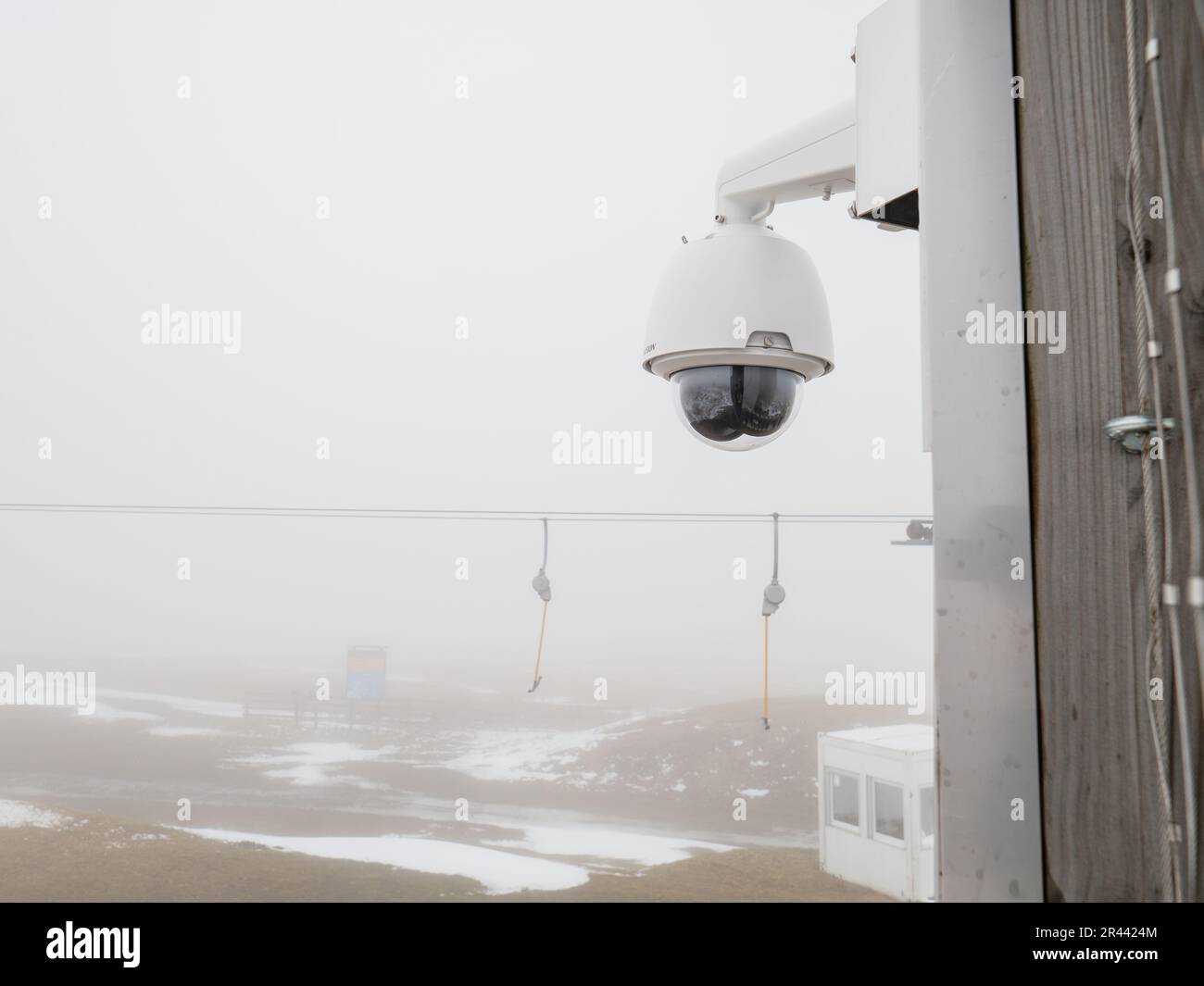 Surveillance camera inside the room on the wall, close view. CCTV ...