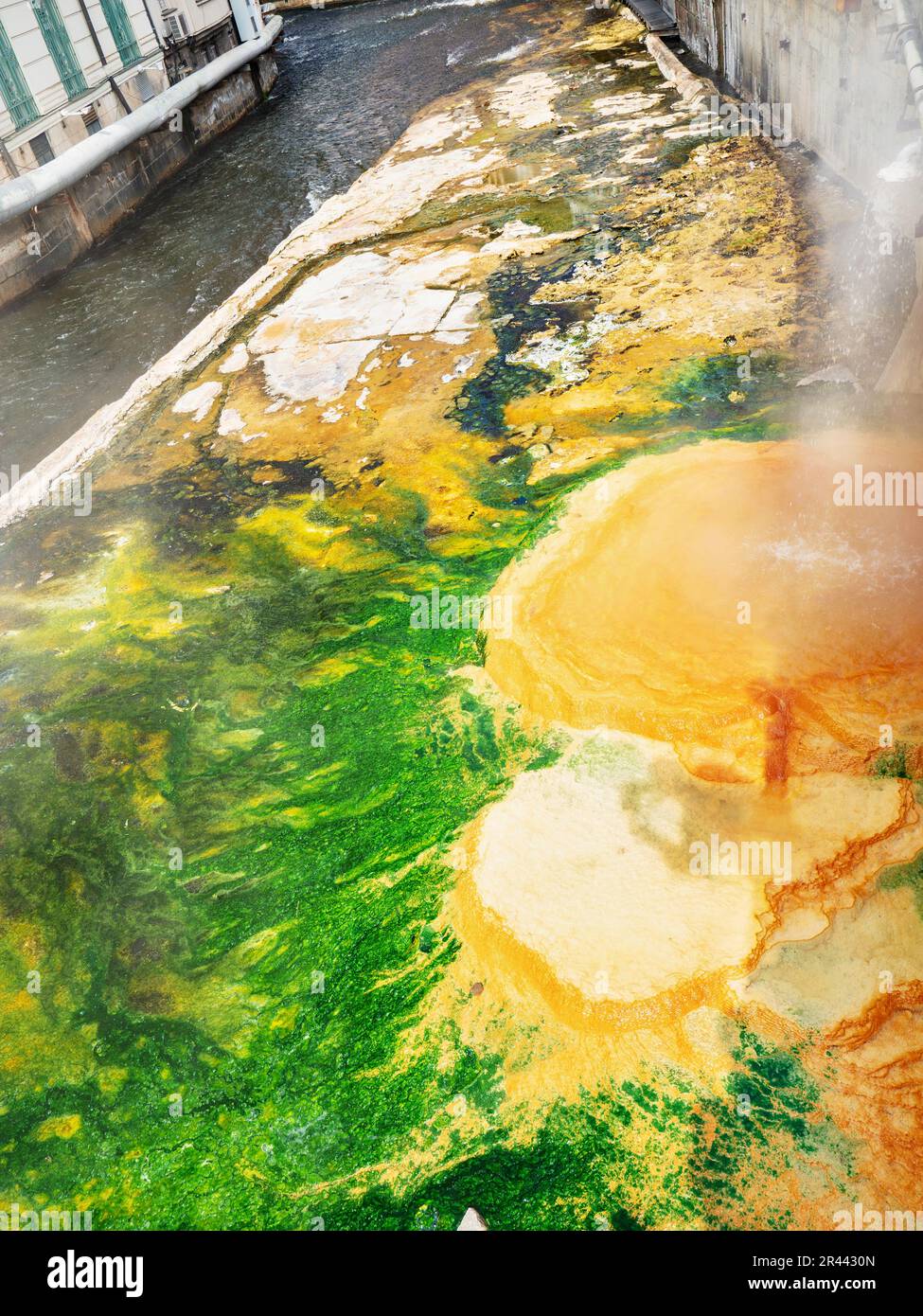 Mineral deposits and efflorescence under the waste water outlet from ...