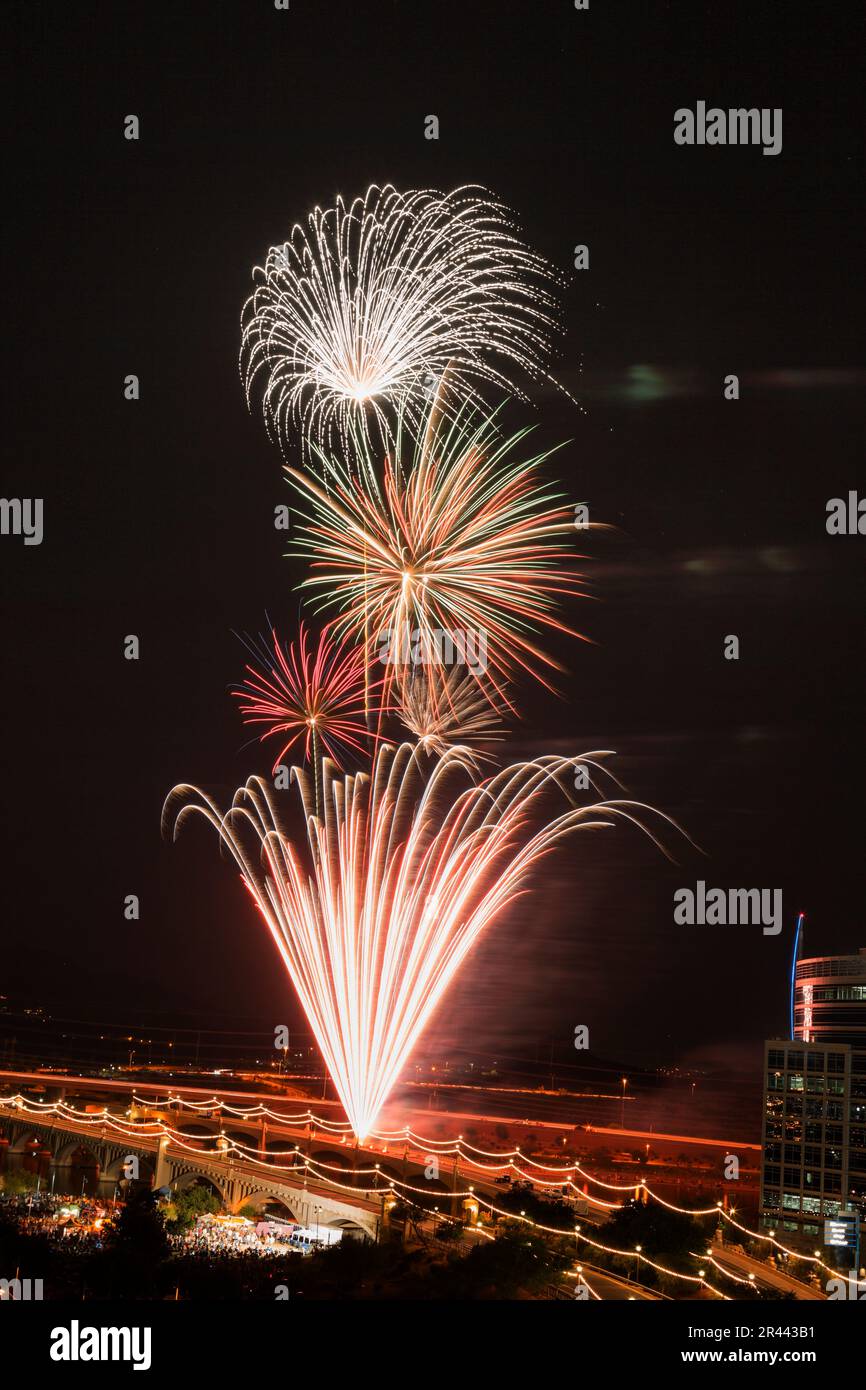 Fireworks over bridge at night Stock Photo - Alamy