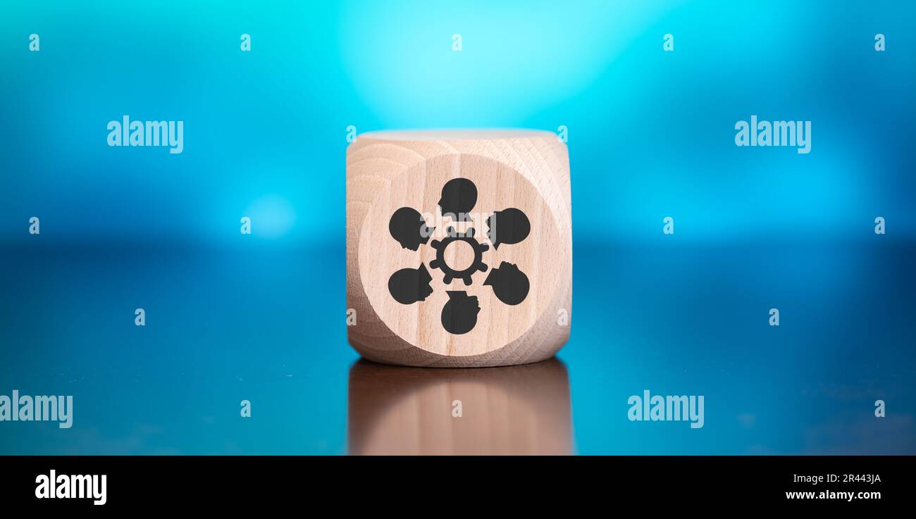Wooden block with symbol of hrm concept on blue background Stock Photo ...