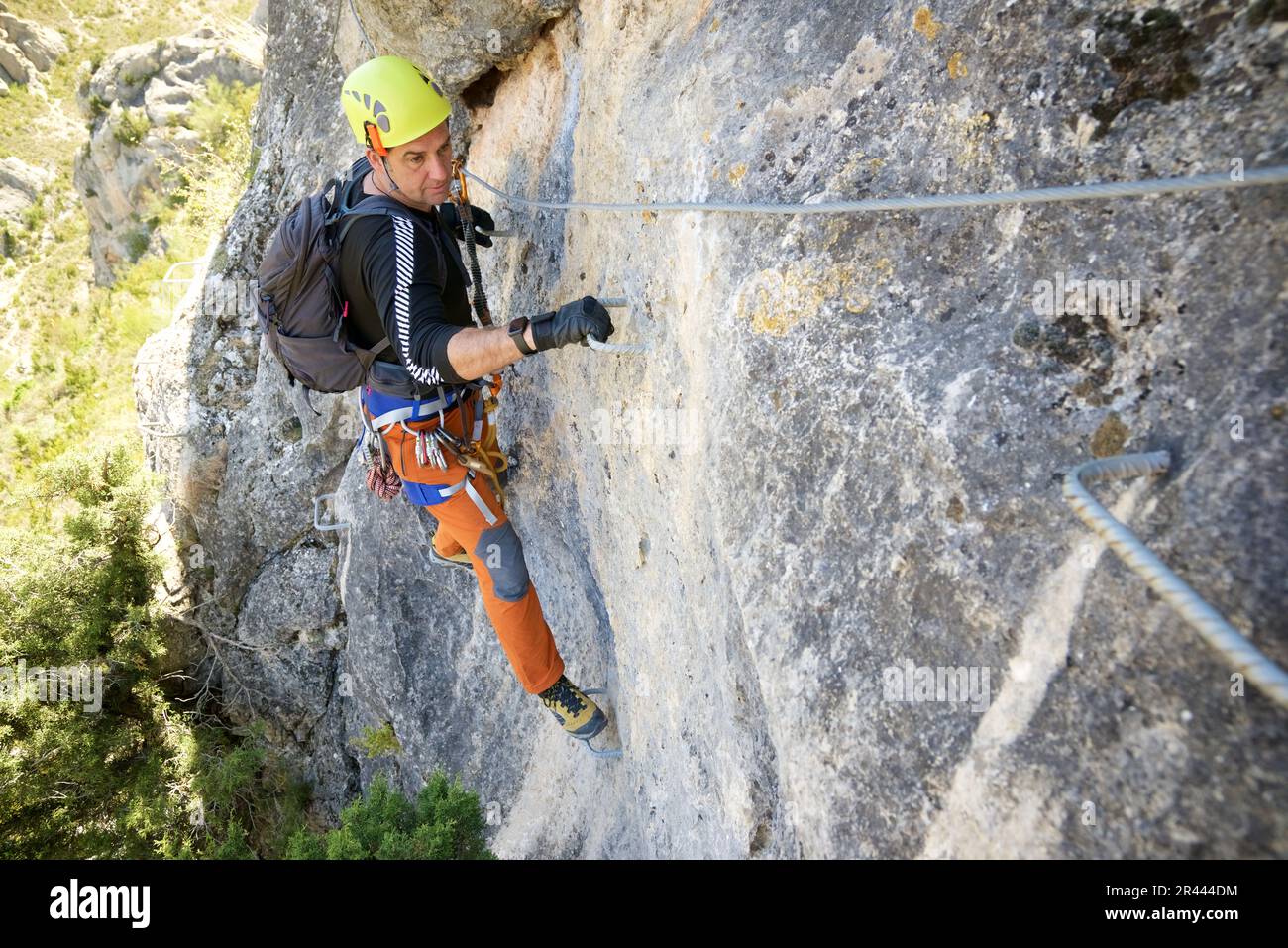 Climbing a ferrata route in Calcena in Spain Stock Photo - Alamy