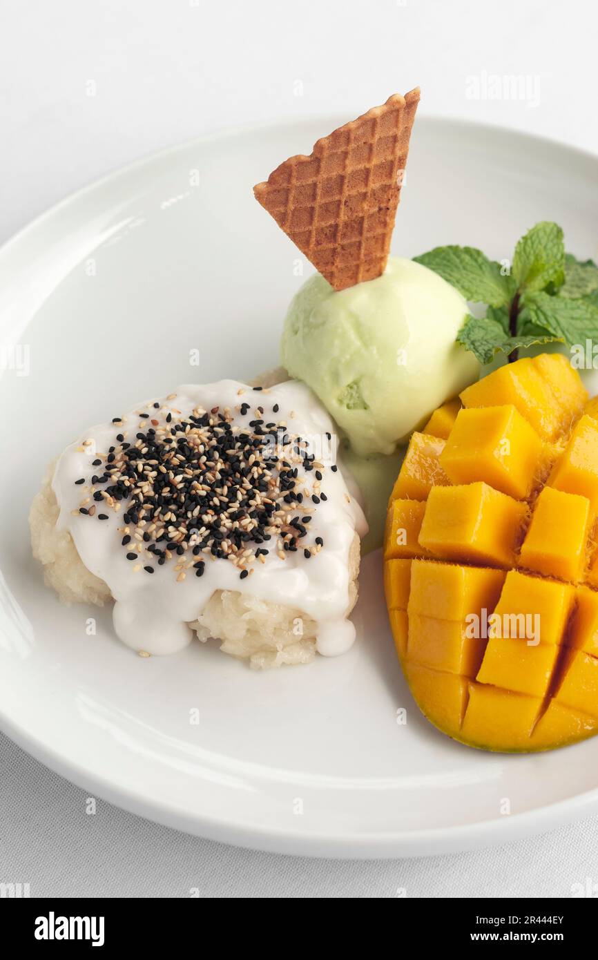 Mango with Sticky Rice and Pandan ice cream Thai famous dessert Stock ...